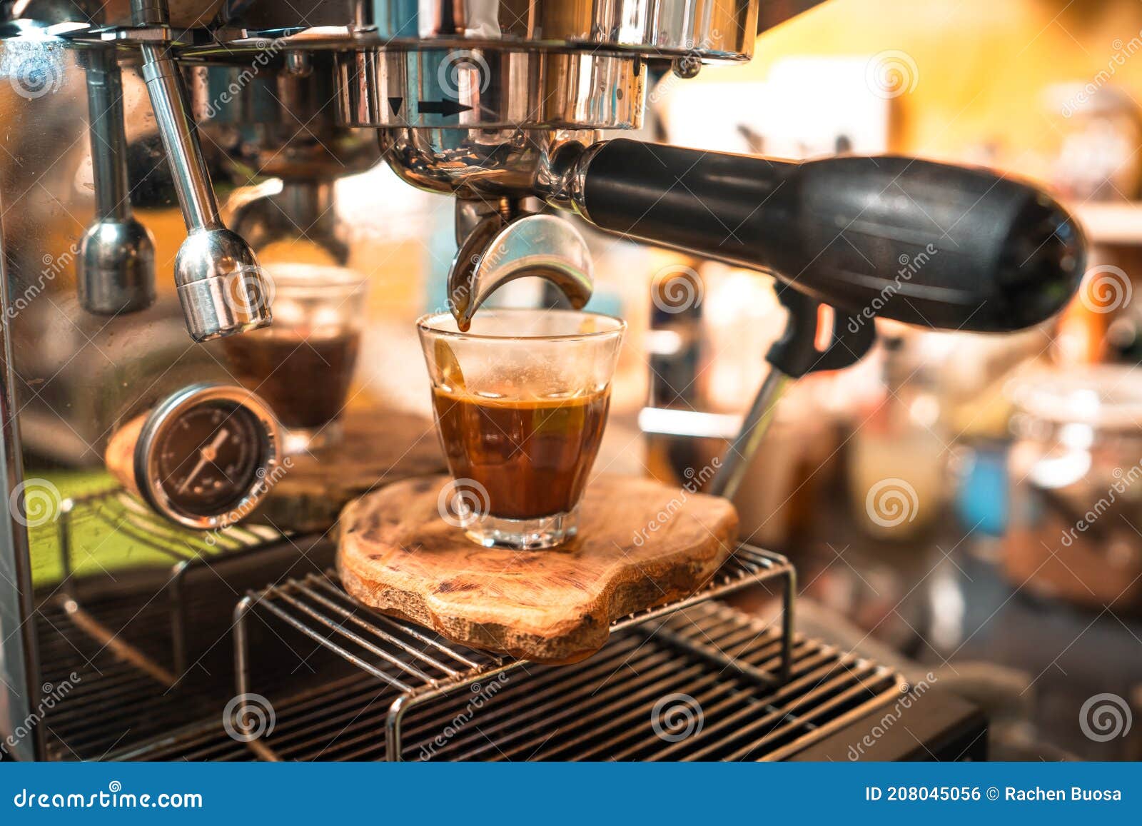 Espresso Coffee is Flowing into the Shot Cup Stock Photo - Image of ...