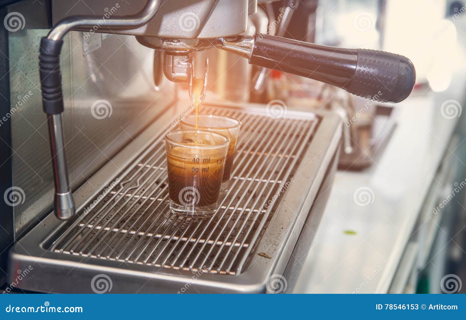 Espresso Coffee Machine with Filter Make Coffee Flowing into a C Stock ...