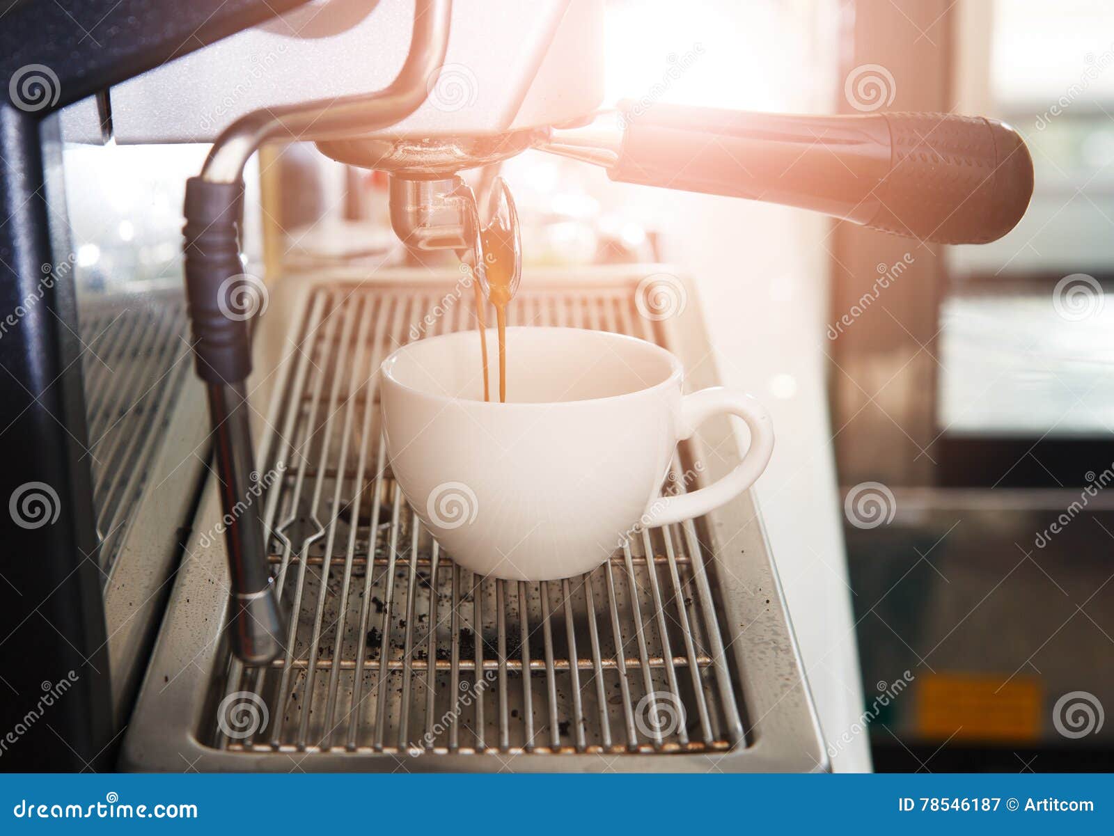 Espresso Coffee Machine with Filter Make Coffee Flowing into a C Stock ...