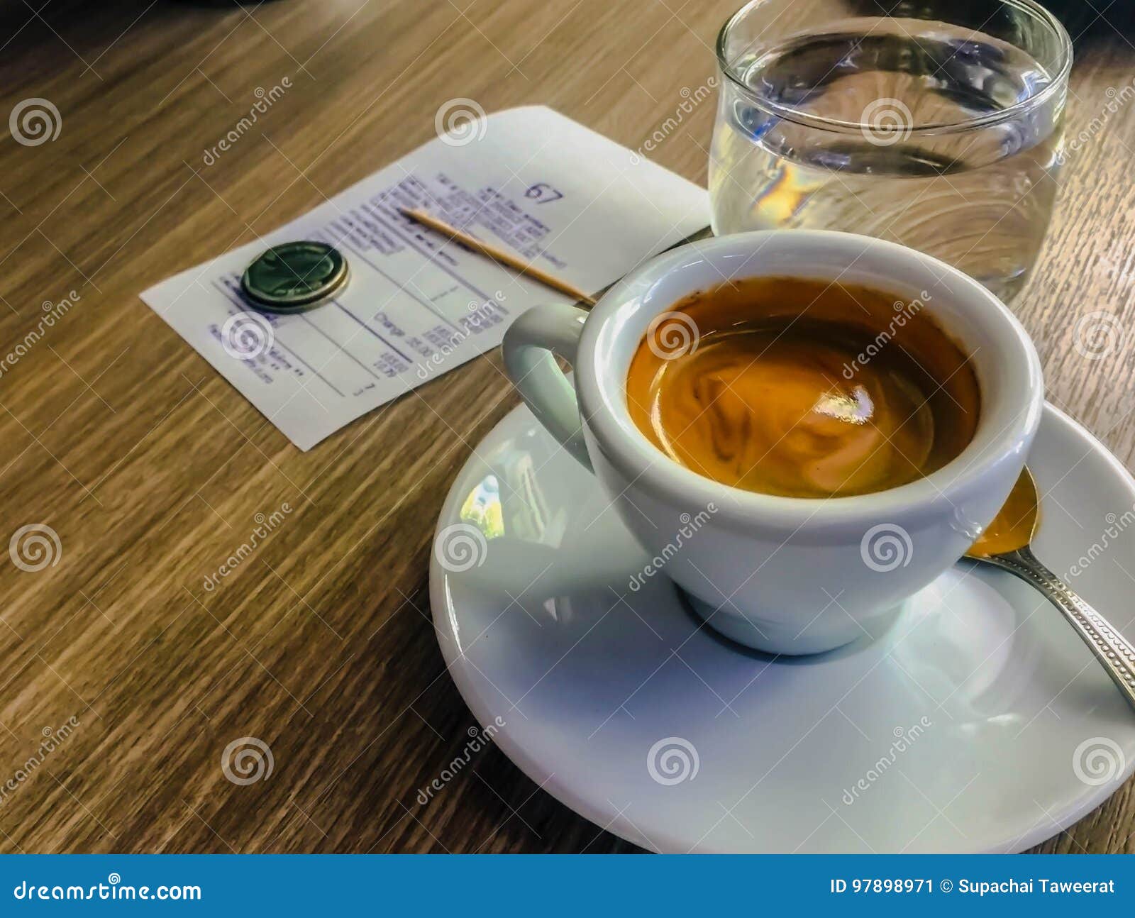 Espresso Coffee on the Table with Bill and Mug. Stock Image - Image of ...