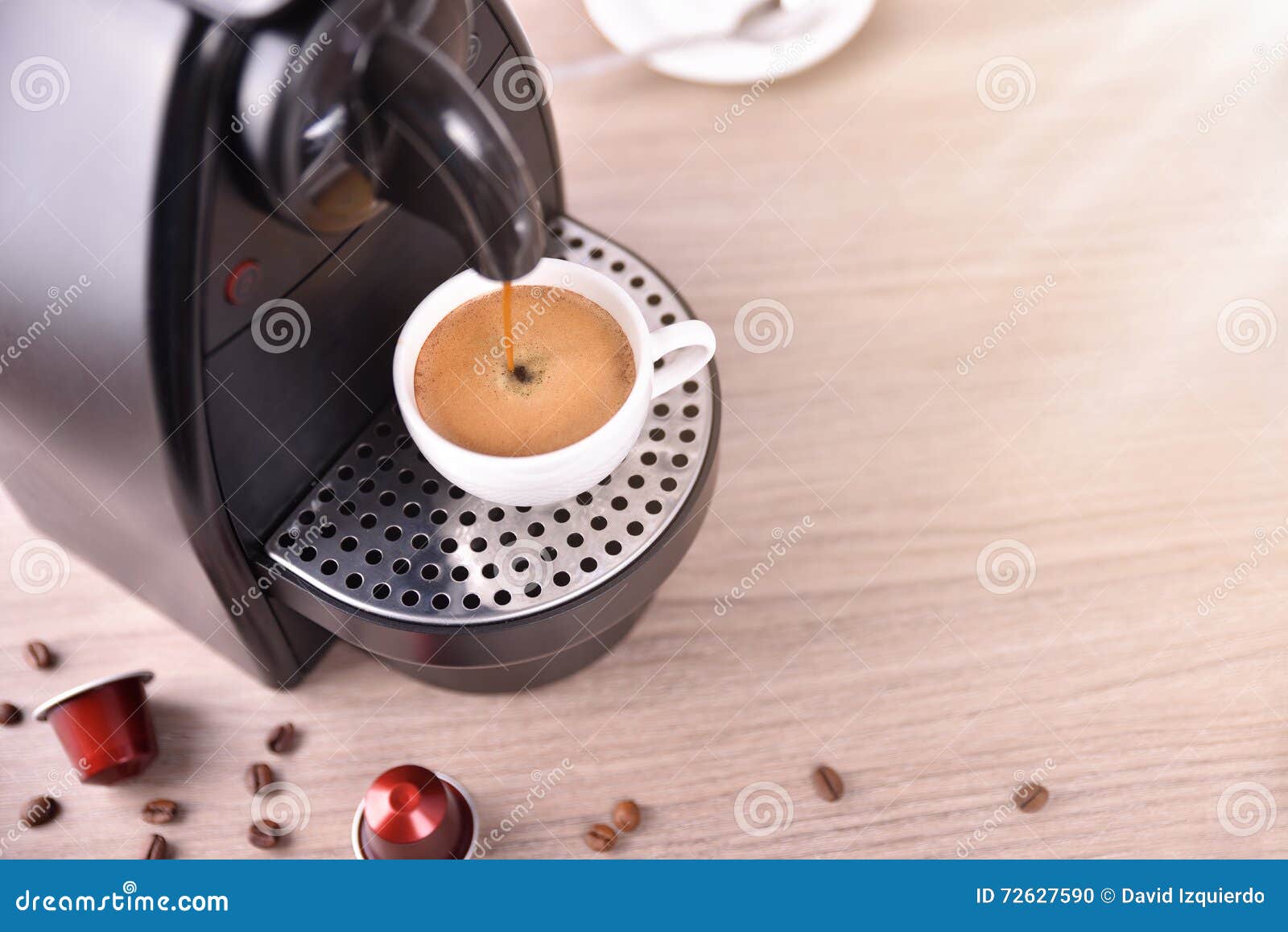 Espresso Machine Making Coffee on Wood Table Elevated View Stock Photo ...
