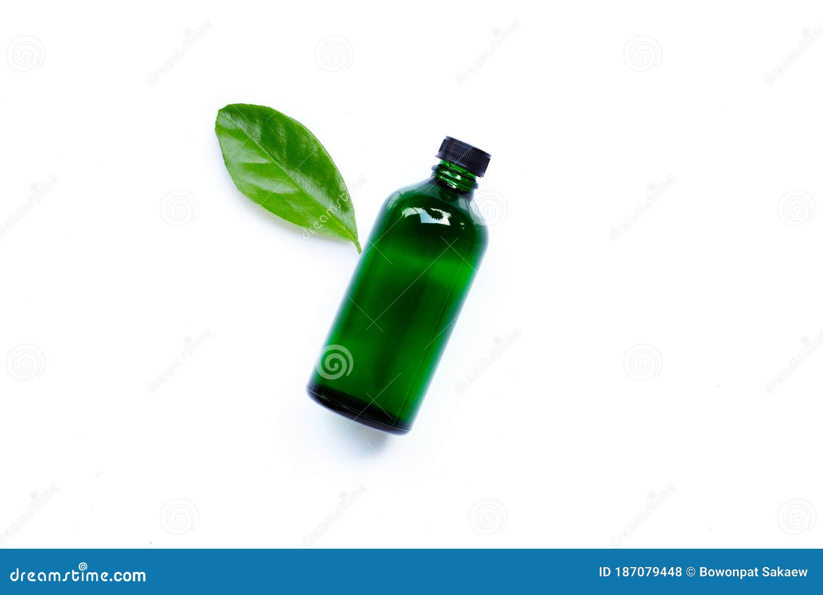 Essential Oil Bottle with Green Leaf on White Background Stock Photo ...