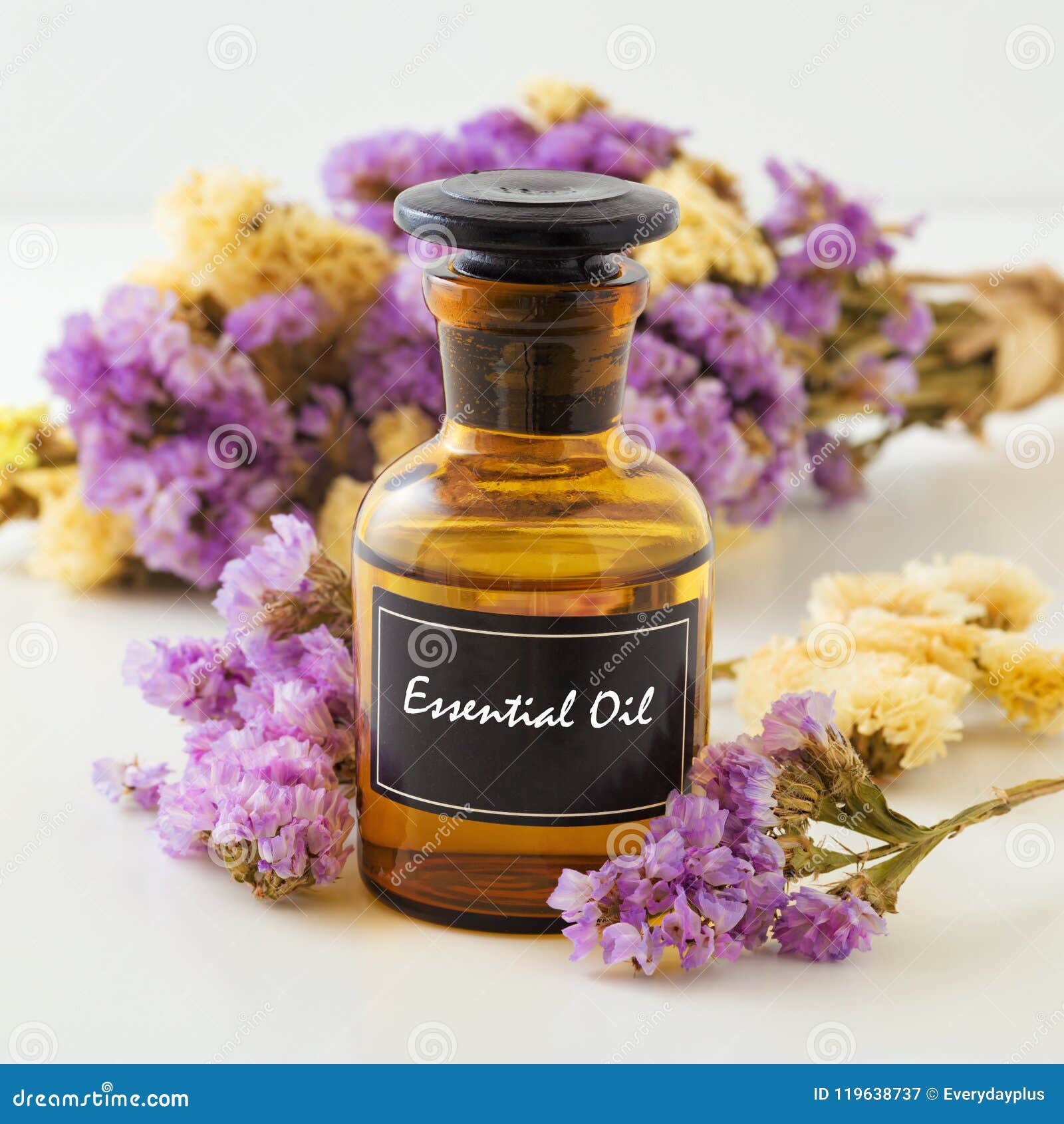 Essential oil with flowers stock image. Image of white - 119638737