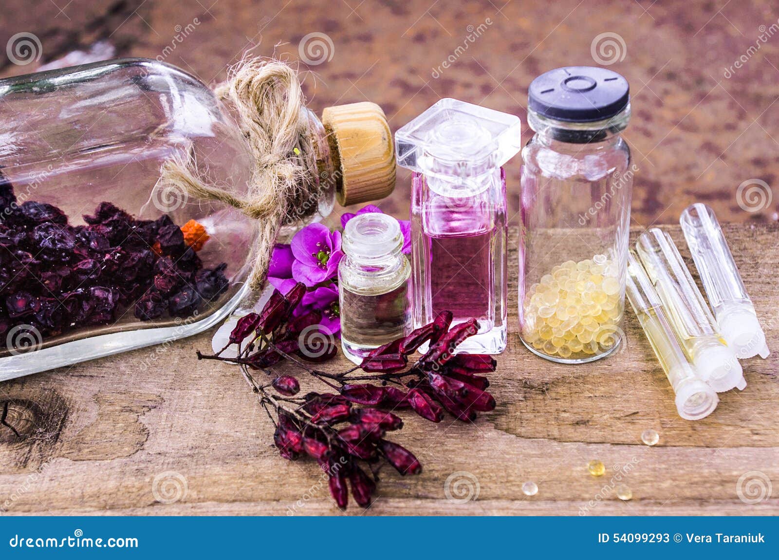 Essential Oil and Herbals in Glass Bottles Stock Image - Image of ...