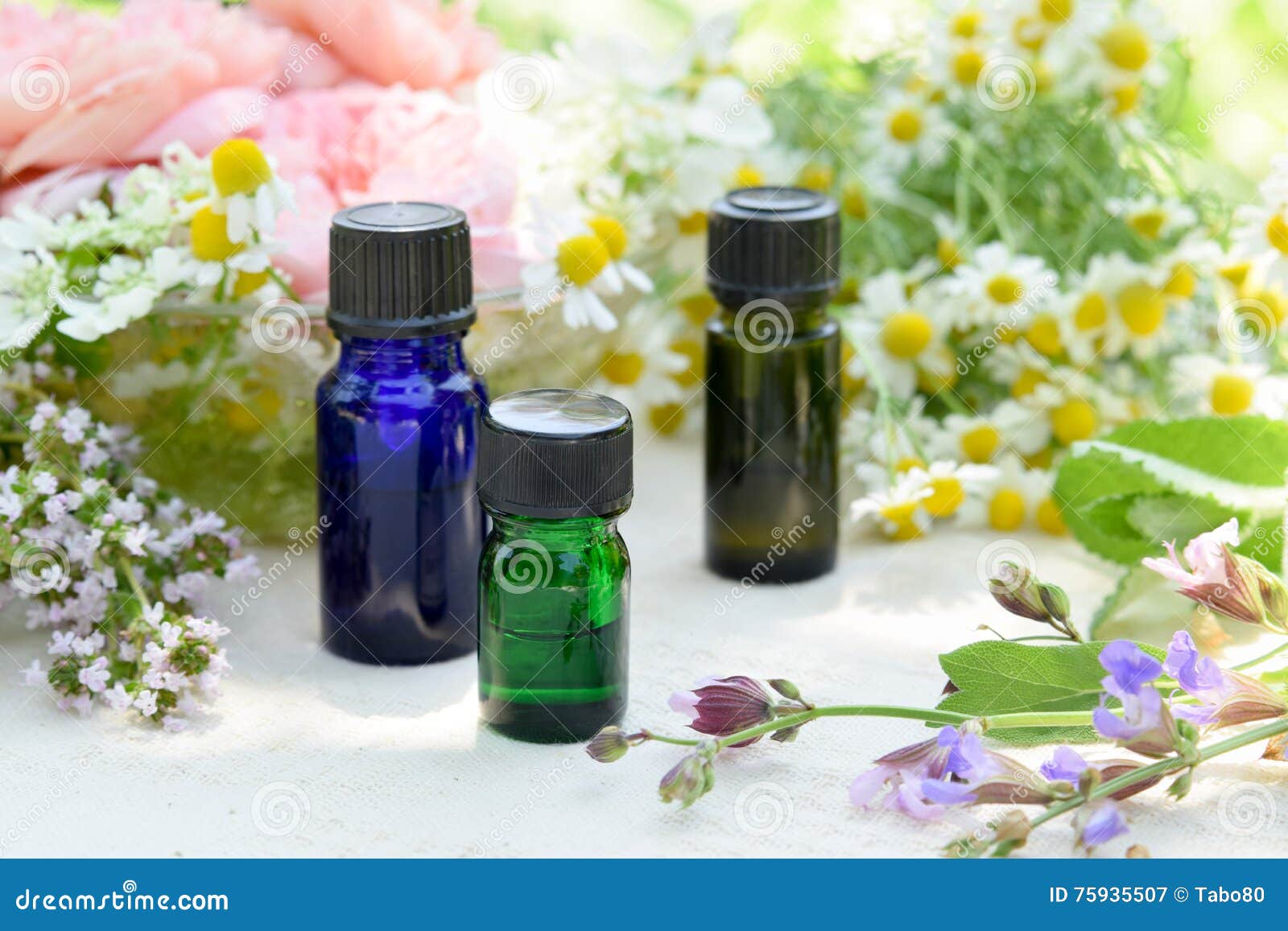 Essential Oils with Herbal Flowers Stock Image - Image of white, wooden ...