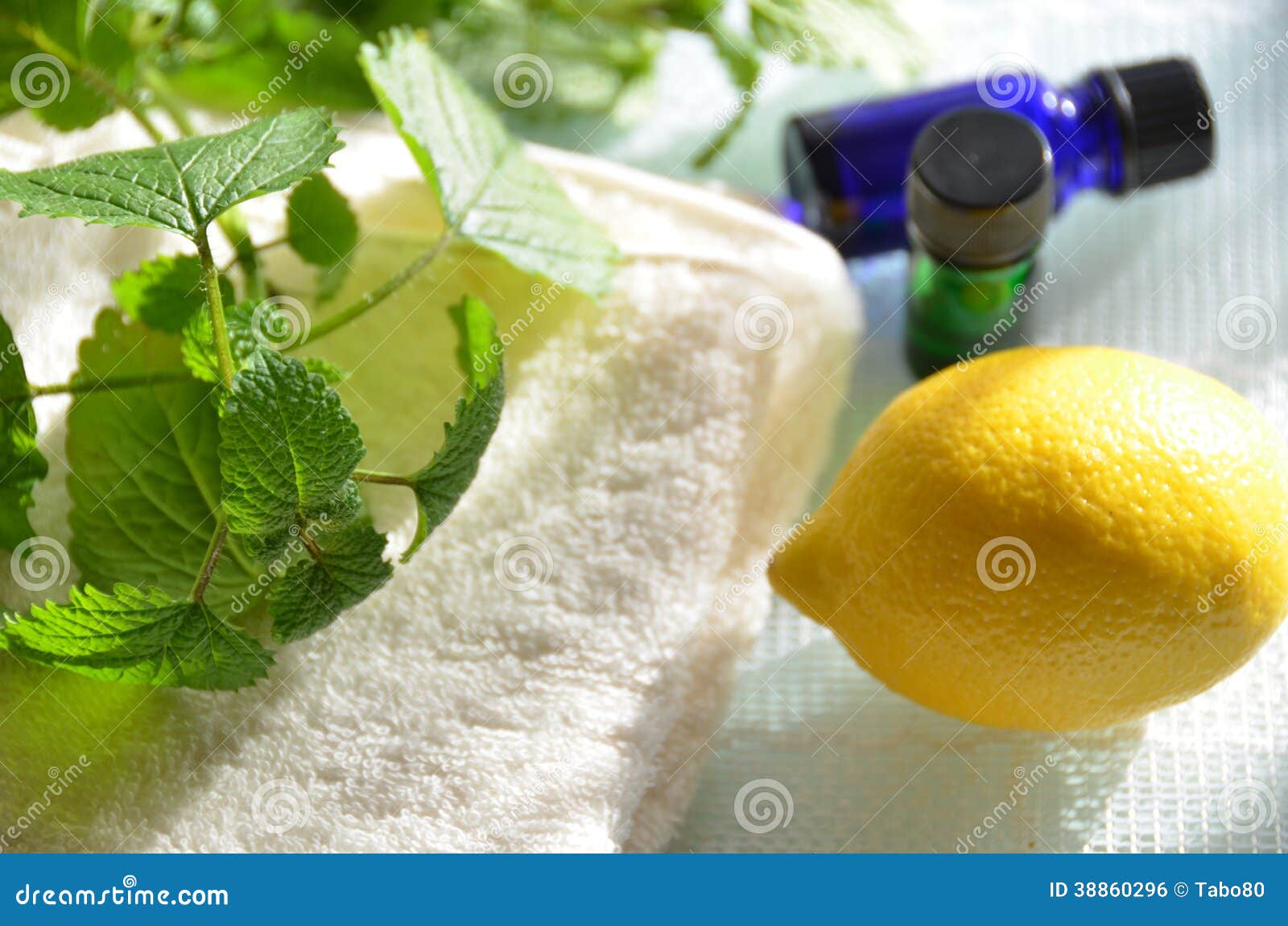 Essential oils with lemon stock photo. Image of bottles - 38860296