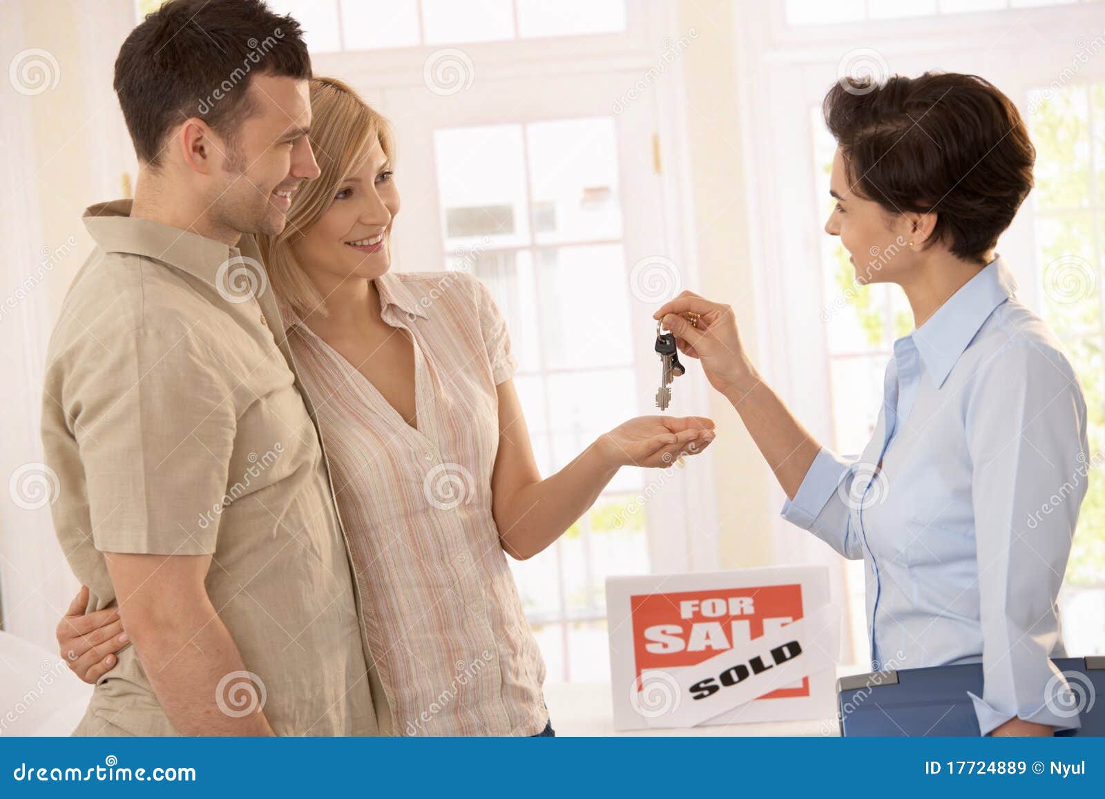 Estate Agent Handing Over Keys Stock Image - Image of american, good ...