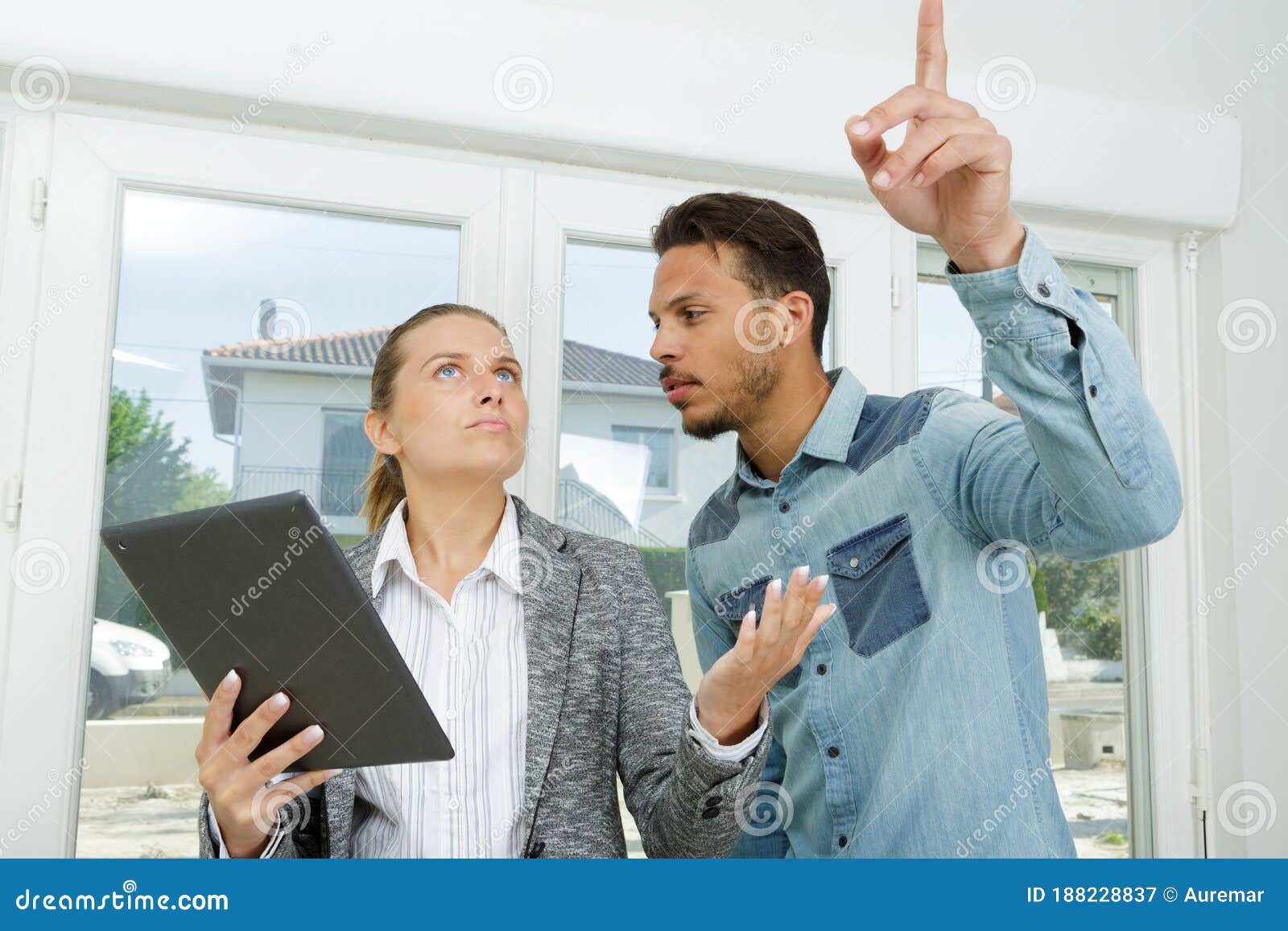 Estate Agent Showing Client Around Property Stock Image - Image of ...