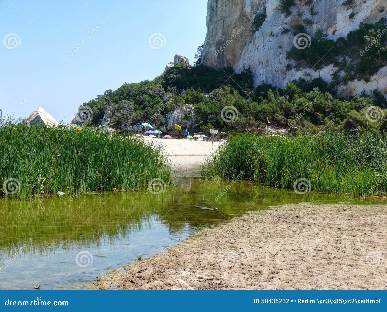 Dry Riverbed And Towering Cliffs In A Huge Natural Gorge Samaria Gorge ...
