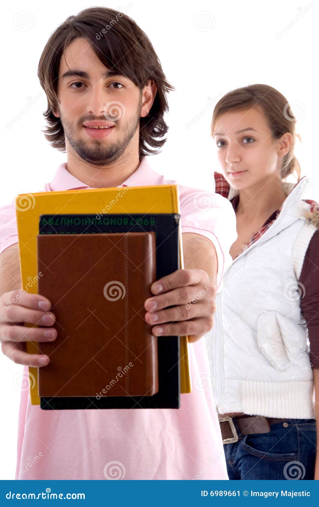 Estudiantes Universitarios Jovenes Con Los Libros Imagen de archivo ...
