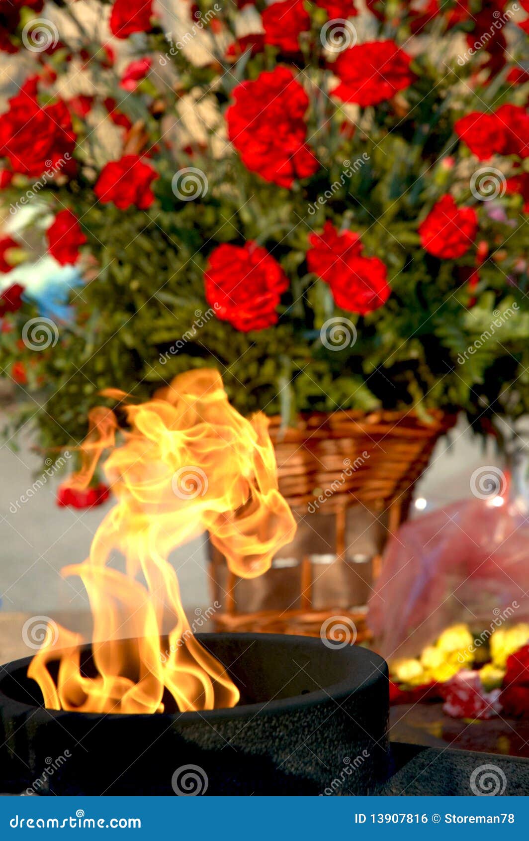 Eternal Fire. The Flames Are Reflected In The Granite. Royalty-Free ...