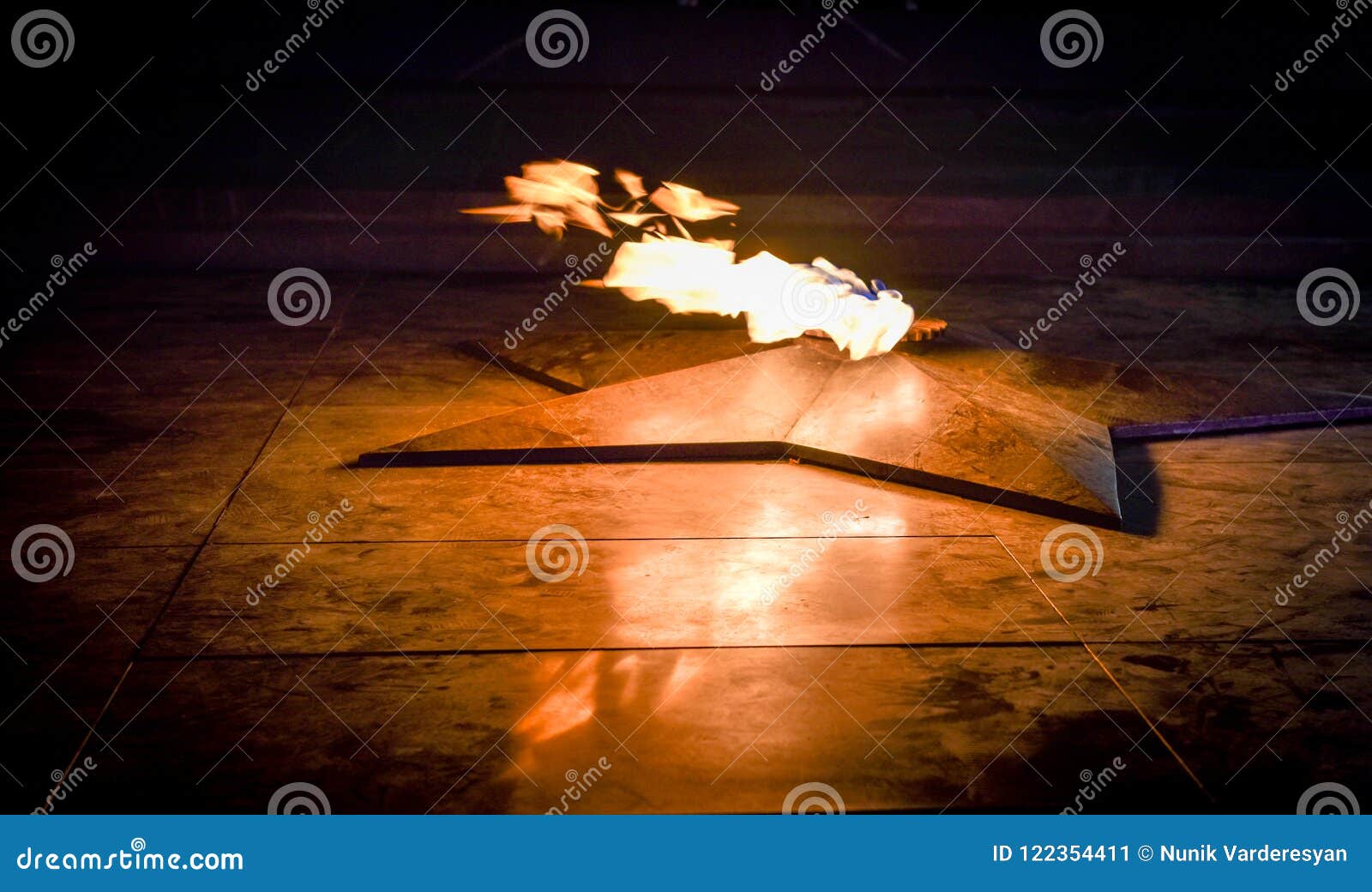 Eternal Flame, Dark Skies Reflected in Granite Editorial Photo - Image ...