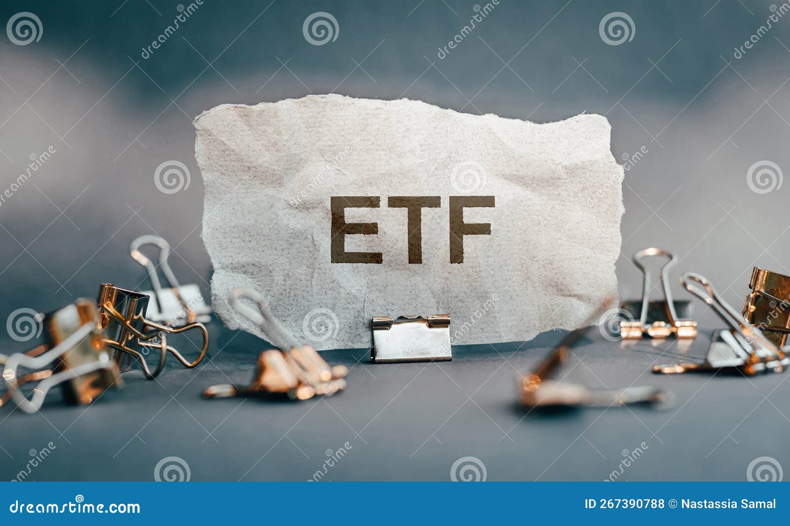 ETF Text on the Torn Paper. ETF is Short for Exchange Traded Fund Stock ...