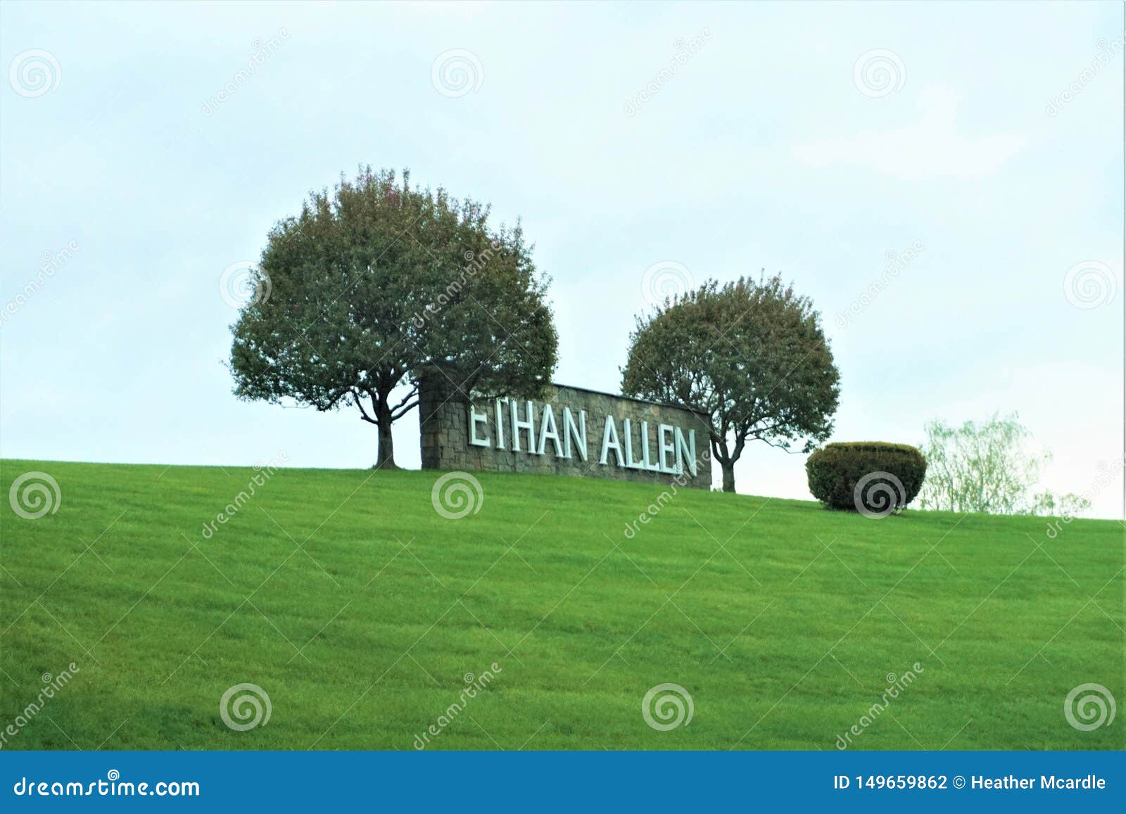 Ethan Allen Sign on Hilltop of Green Grass Editorial Photography ...
