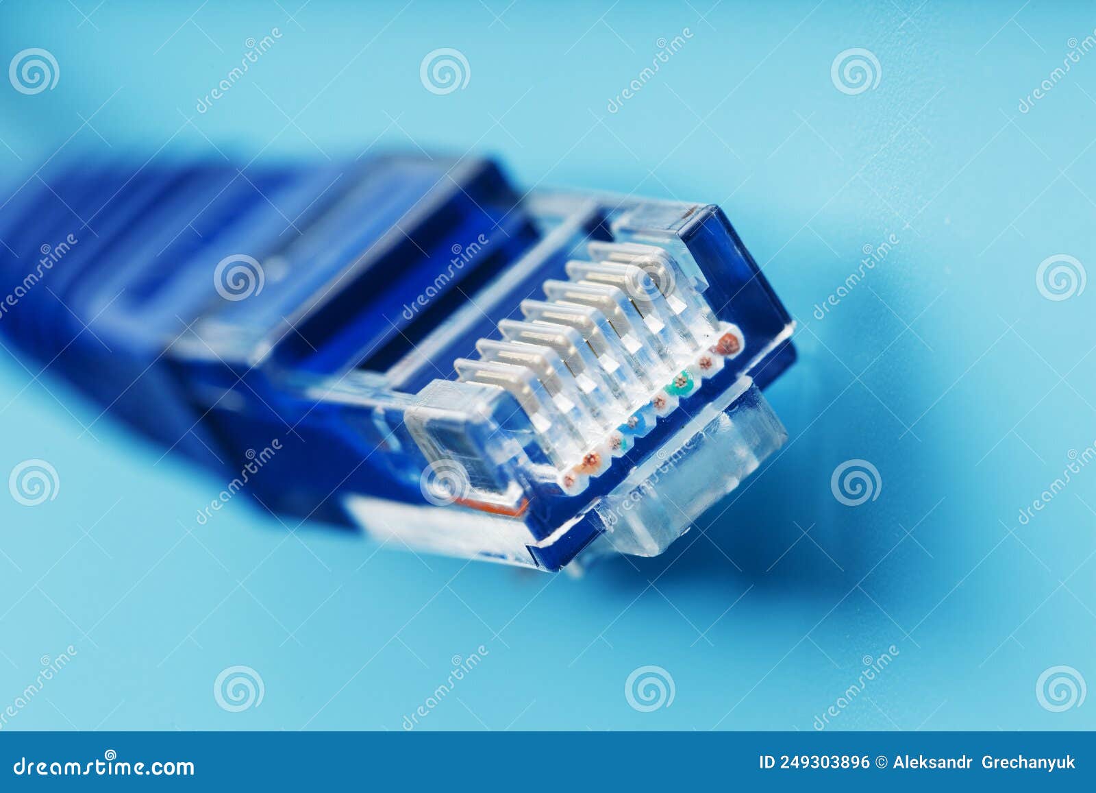 Ethernet Cable Connector Patch Cord Cord Close-up on a Blue Background ...