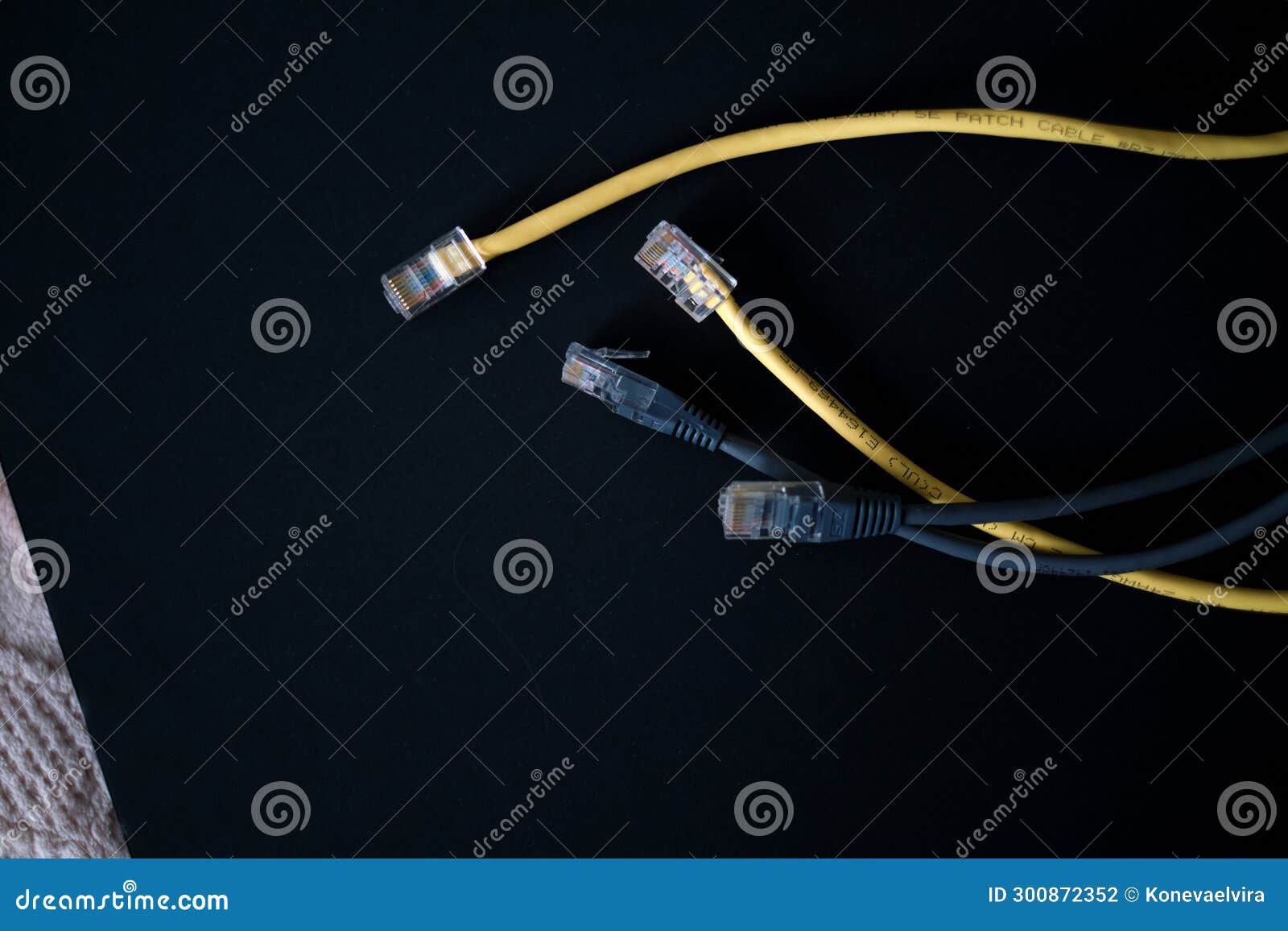 Ethernet Cables with Gold-plated Connectors Rest on a Dark Surface ...