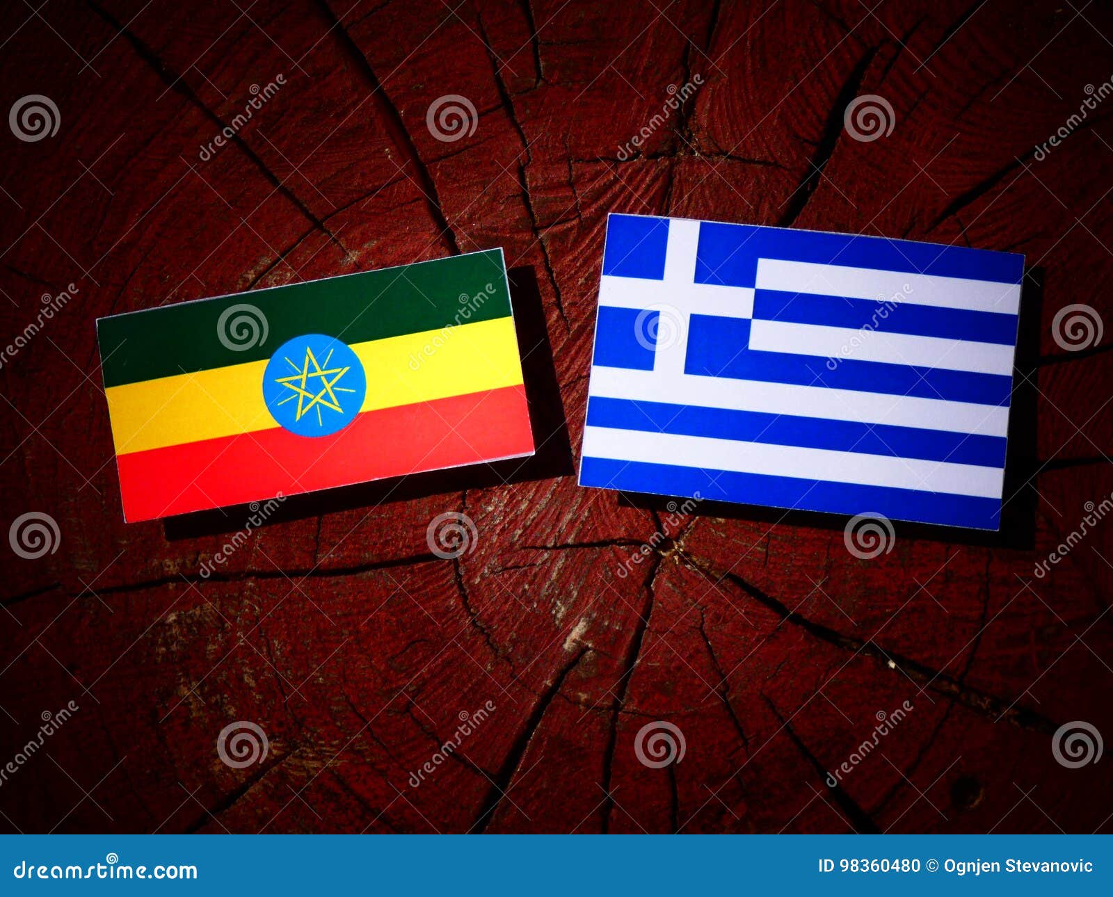 Ethiopian Flag with Greek Flag on a Tree Stump Isolated Stock Photo ...