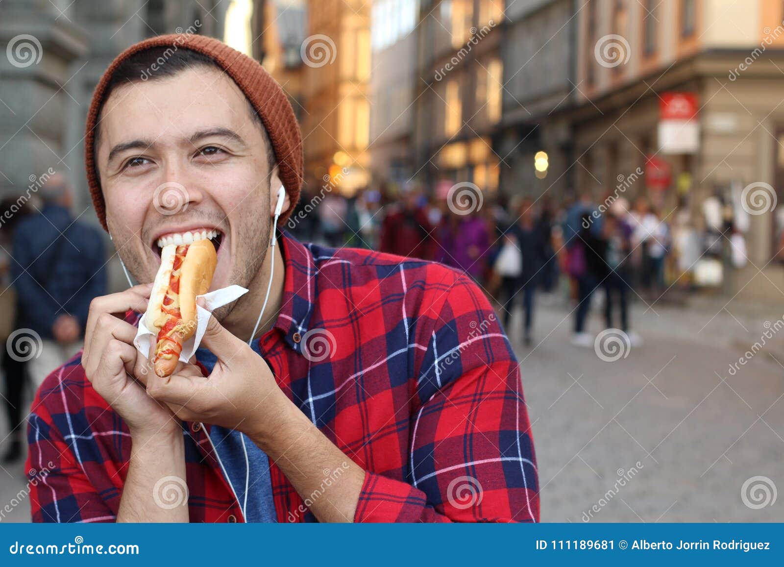 Ethnic Male Devouring a Hot Dog Stock Image - Image of portrait, people ...