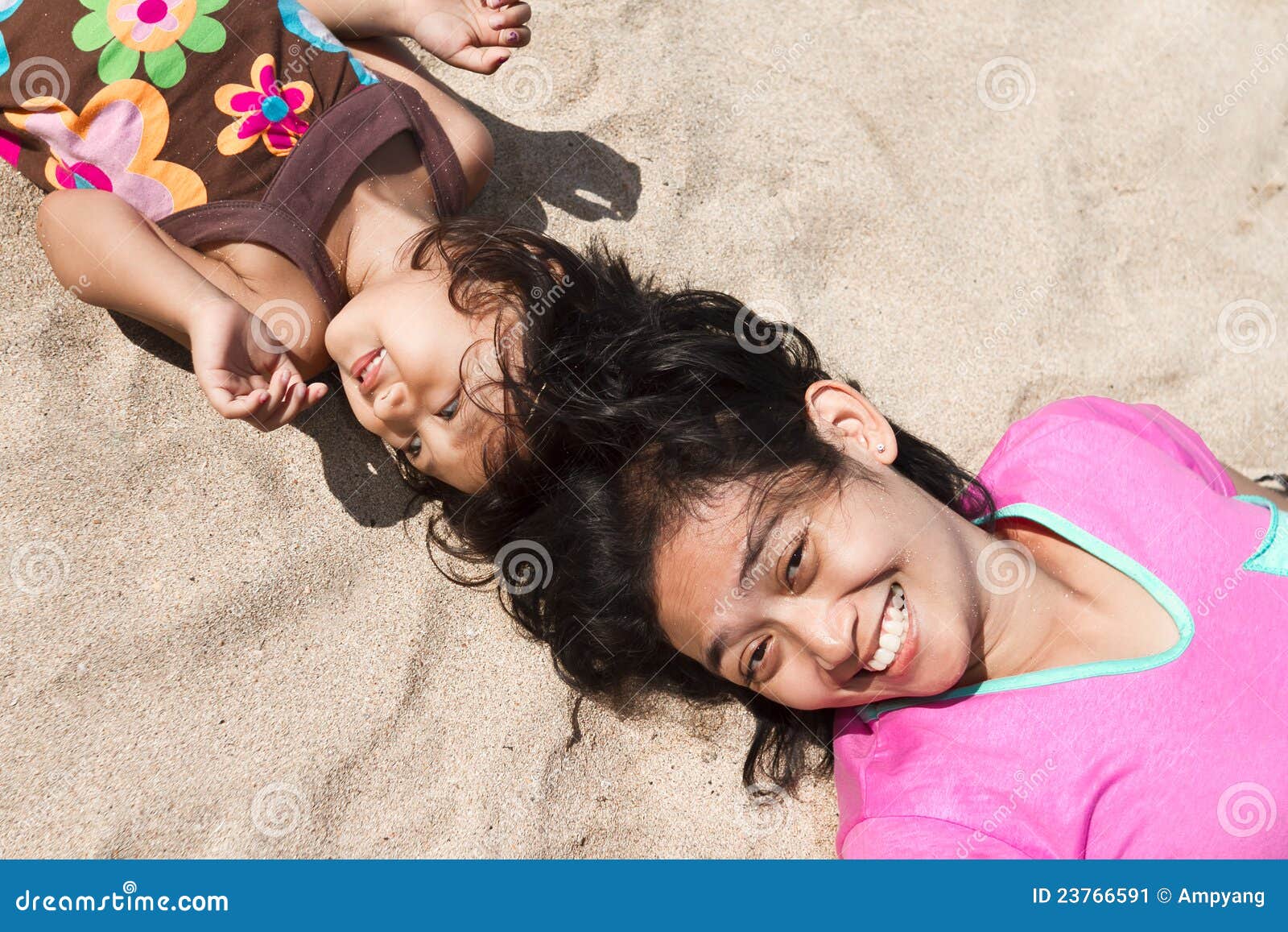 Ethnic Mother and Child Lay Down on Beach Sand Stock Image - Image of ...