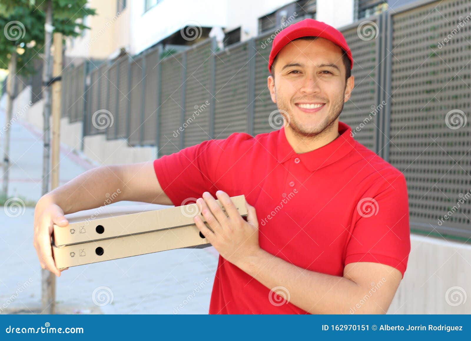 Ethnic Pizza Delivery Guy at Work Stock Image - Image of order, pile ...
