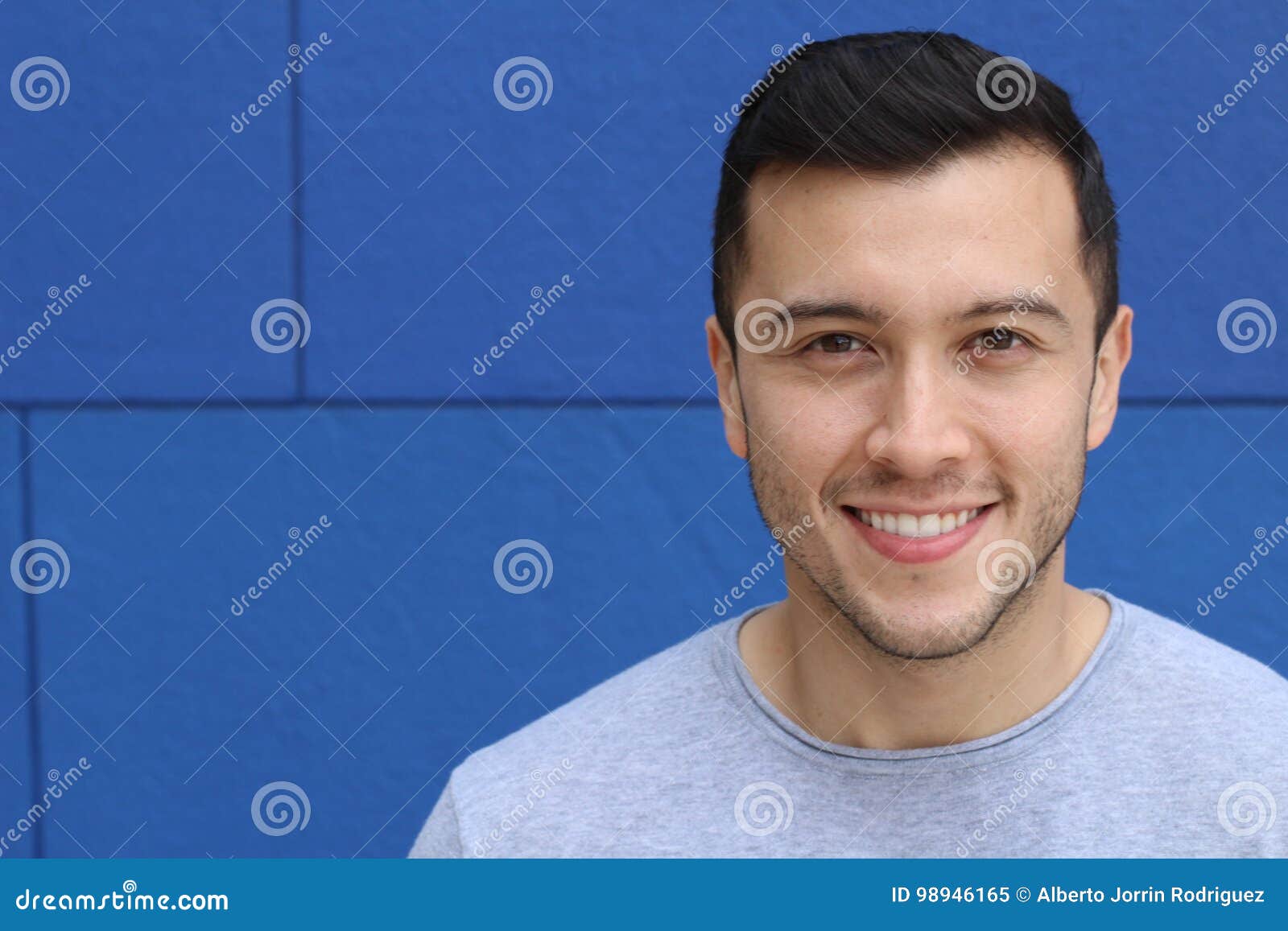 Ethnically Ambiguous Male Smiling with Copy Space Stock Image - Image ...
