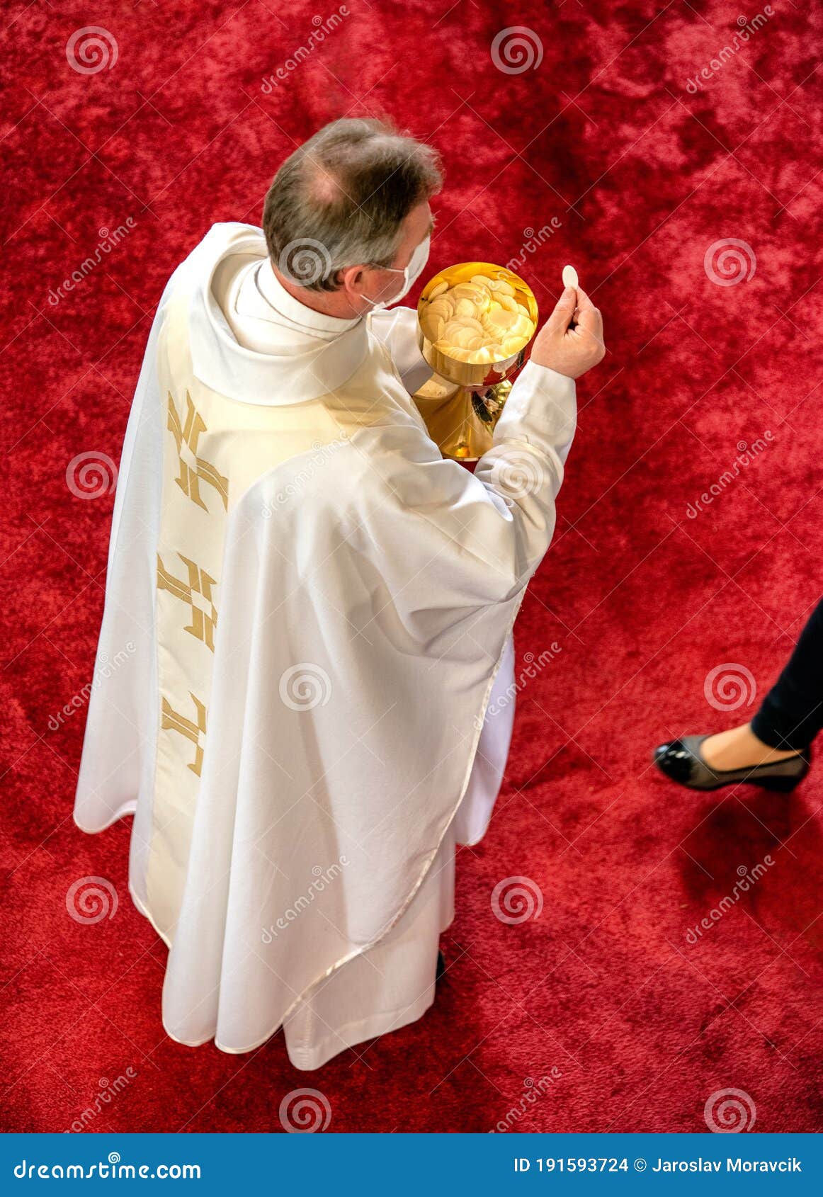 Eucharistic Celebration, the Priest Gave the Bread during Coronavirus ...