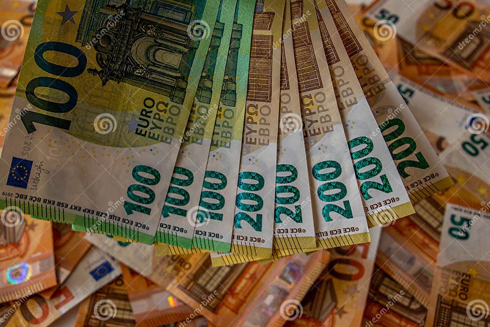 Euro bills of 100 and 200 stock photo. Image of note - 177409376