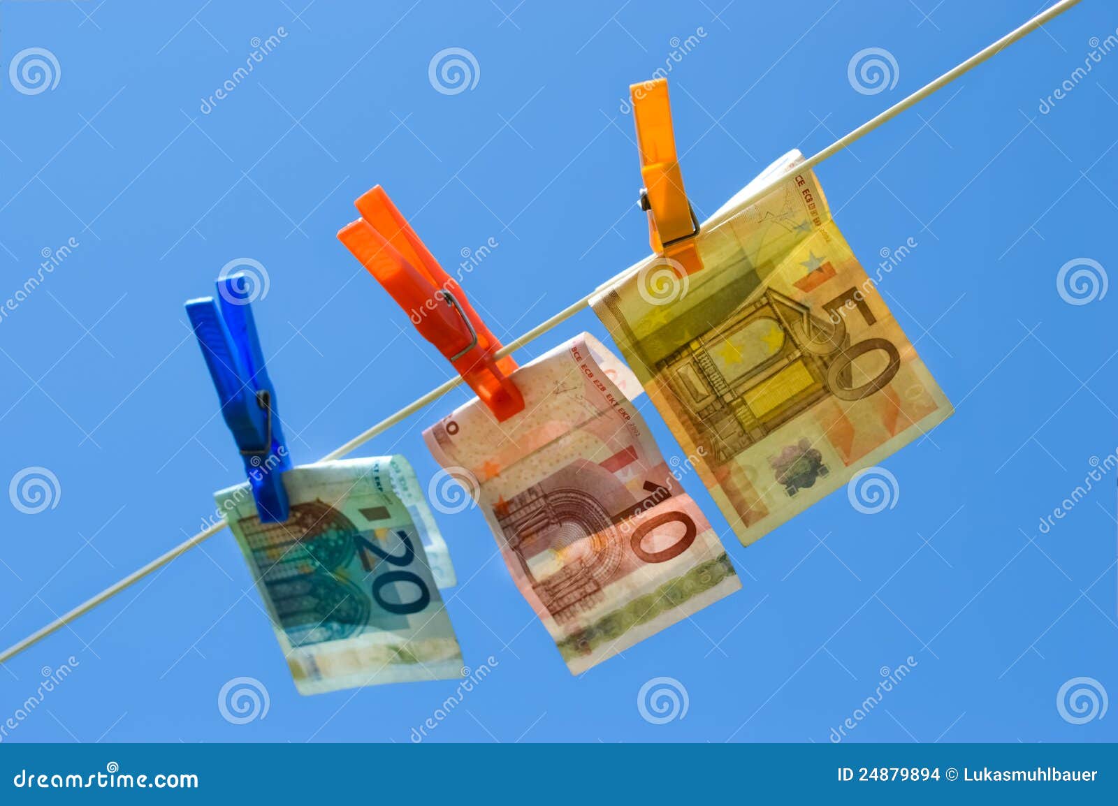 Euro bills on washing line stock photo. Image of property - 24879894