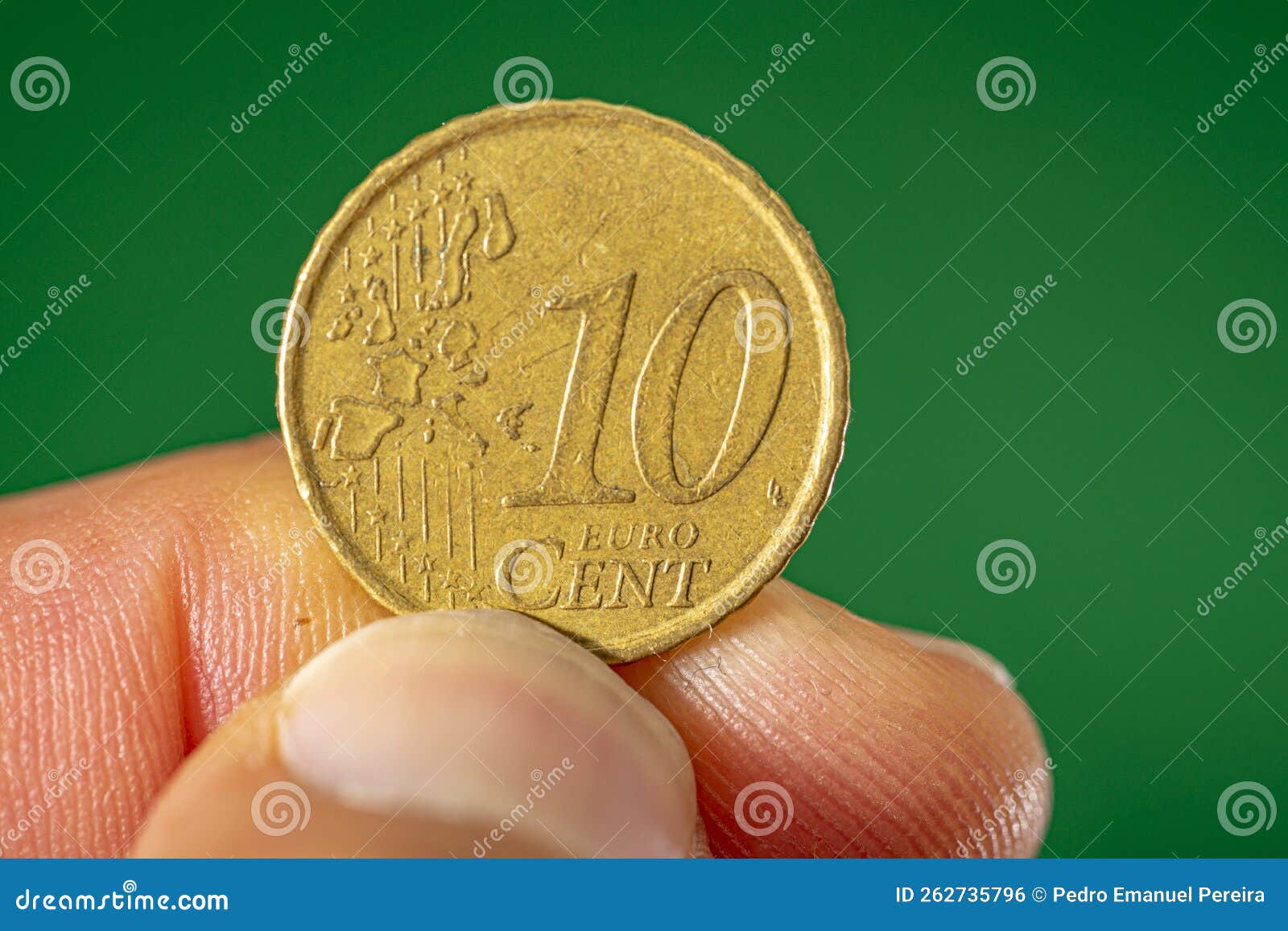 10 Euro Cent Coin Face Held between Thumb and Index Finger. Stock Photo ...