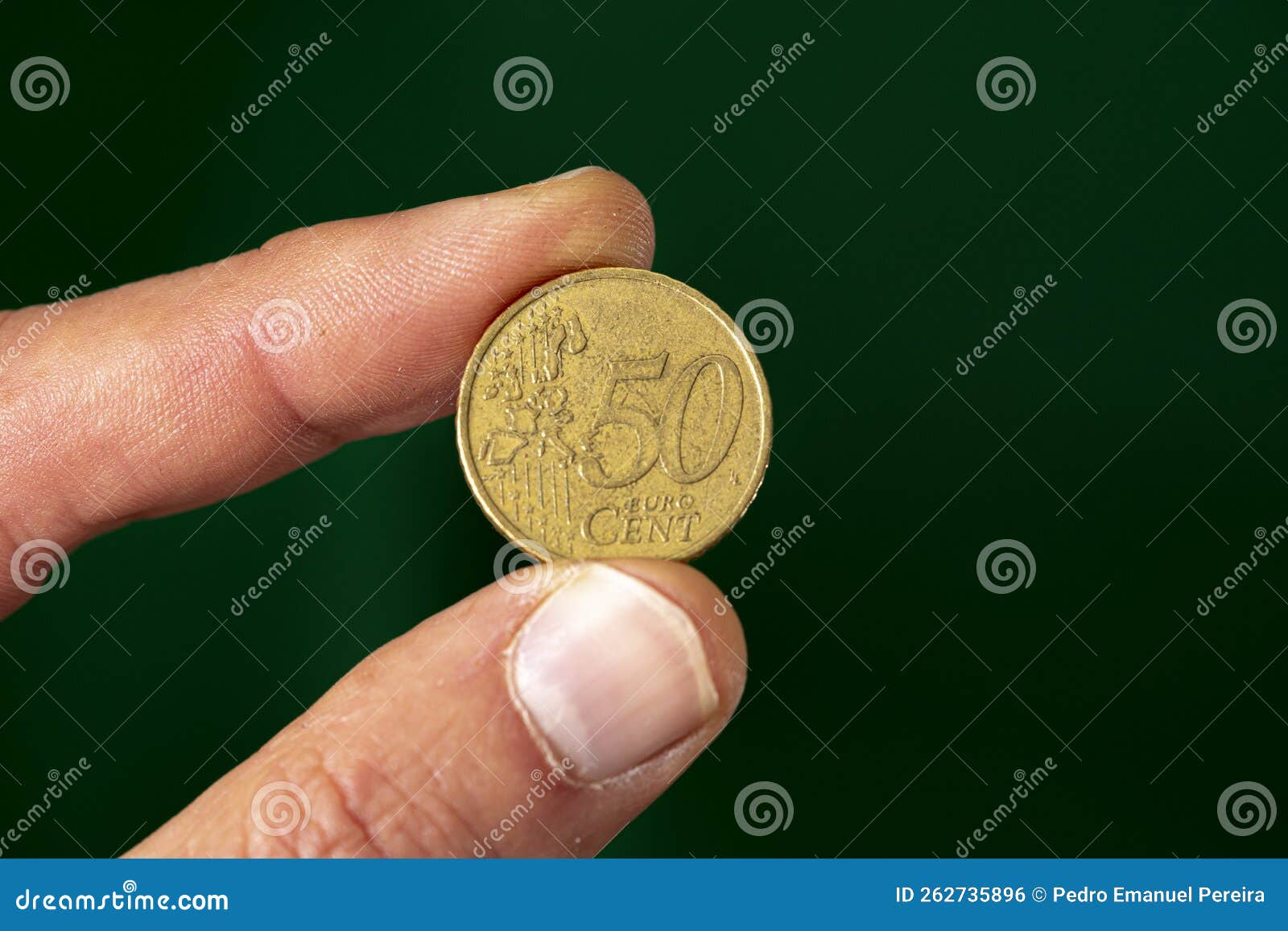50 Euro Cent Coin Face Held between Thumb and Index Finger. Stock Photo ...