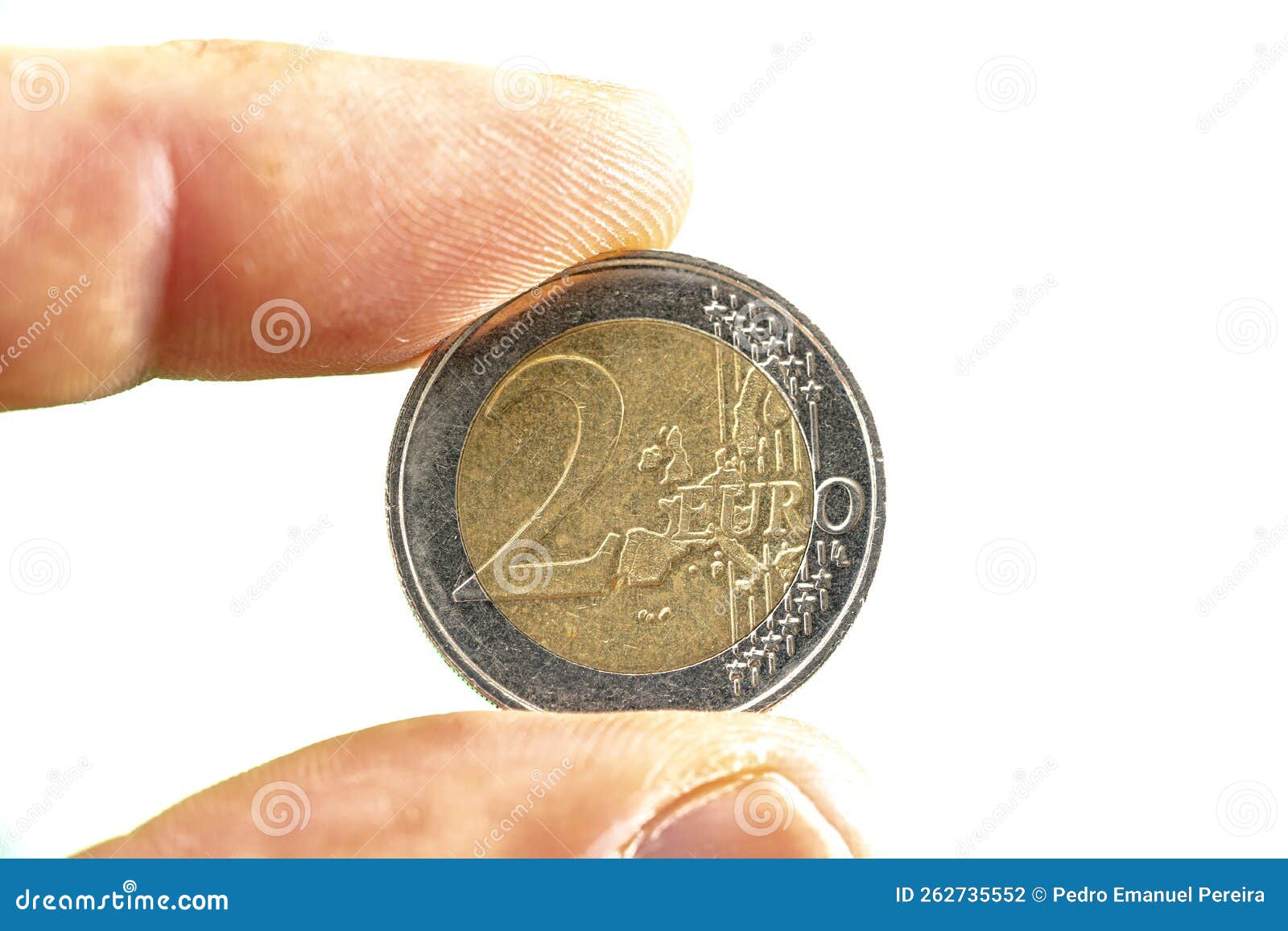 2 Euro Coin Face Held between Thumb and Index Finger. Stock Photo ...