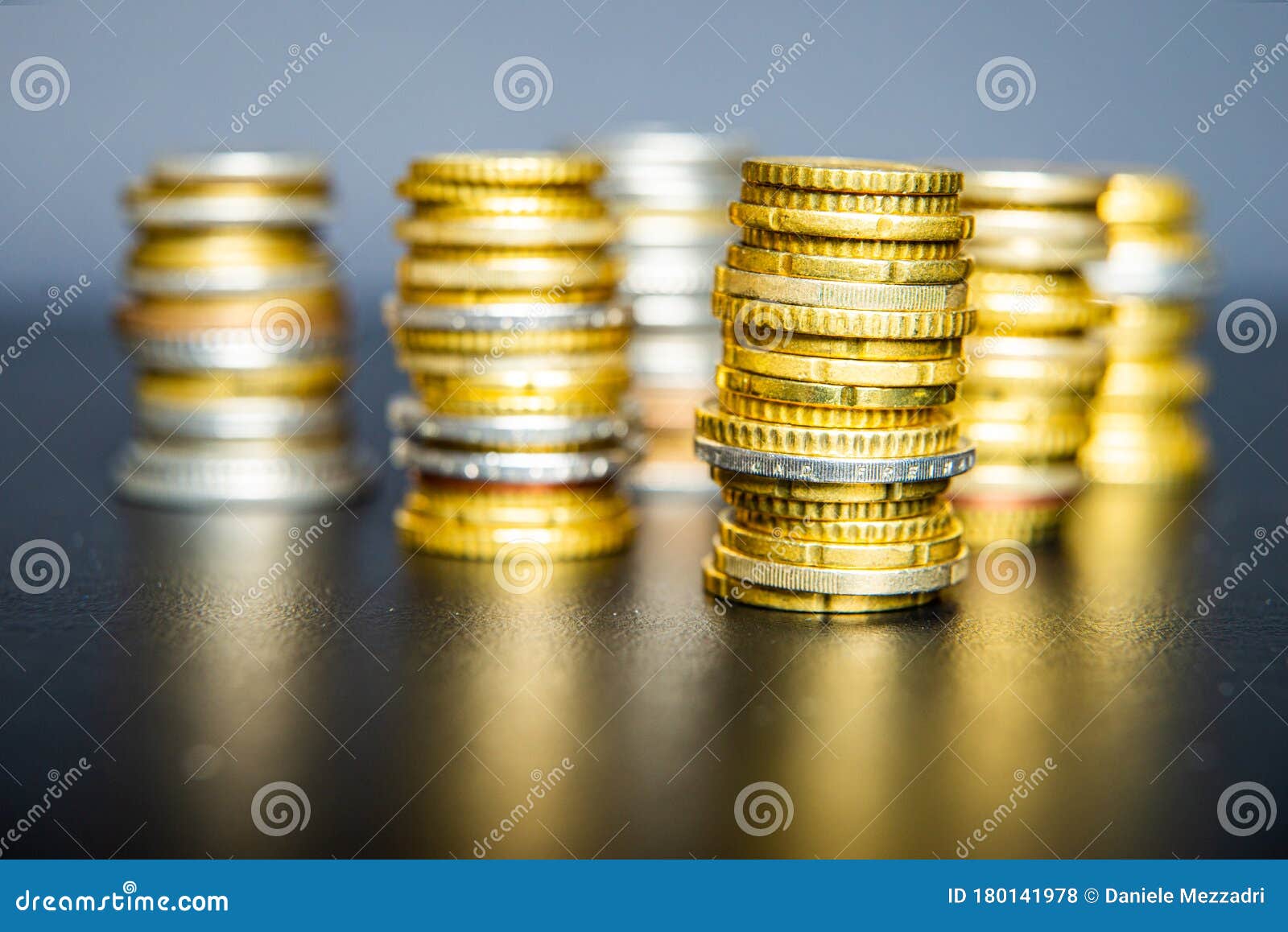 Euro coins on dark table stock photo. Image of anot - 180141978
