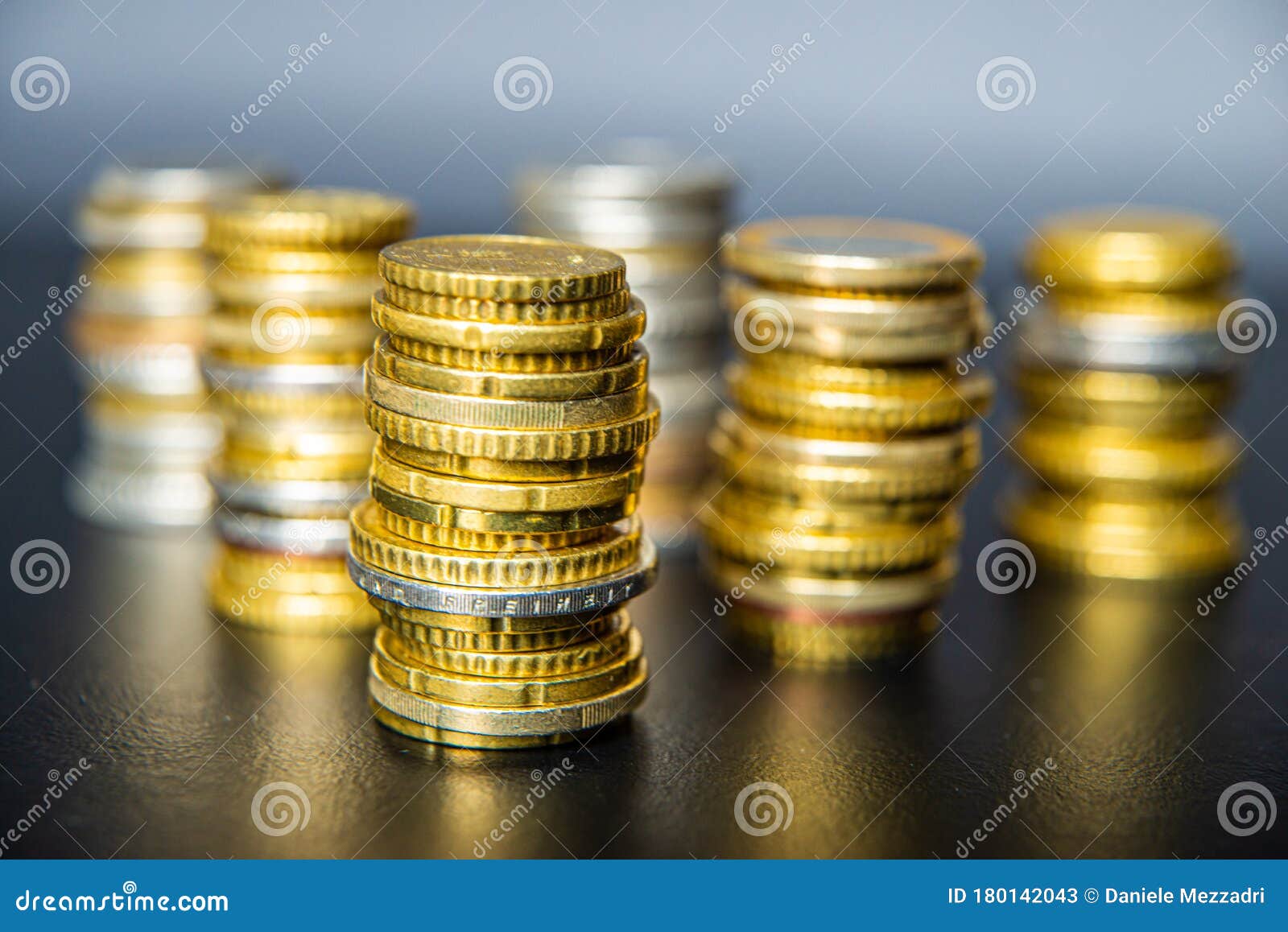 Euro coins on dark table stock image. Image of interests - 180142043
