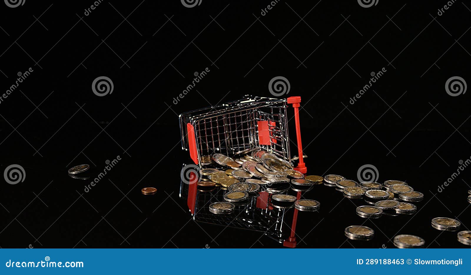 Euro Coins in Trolley Rolling Against Black Background Stock Image ...