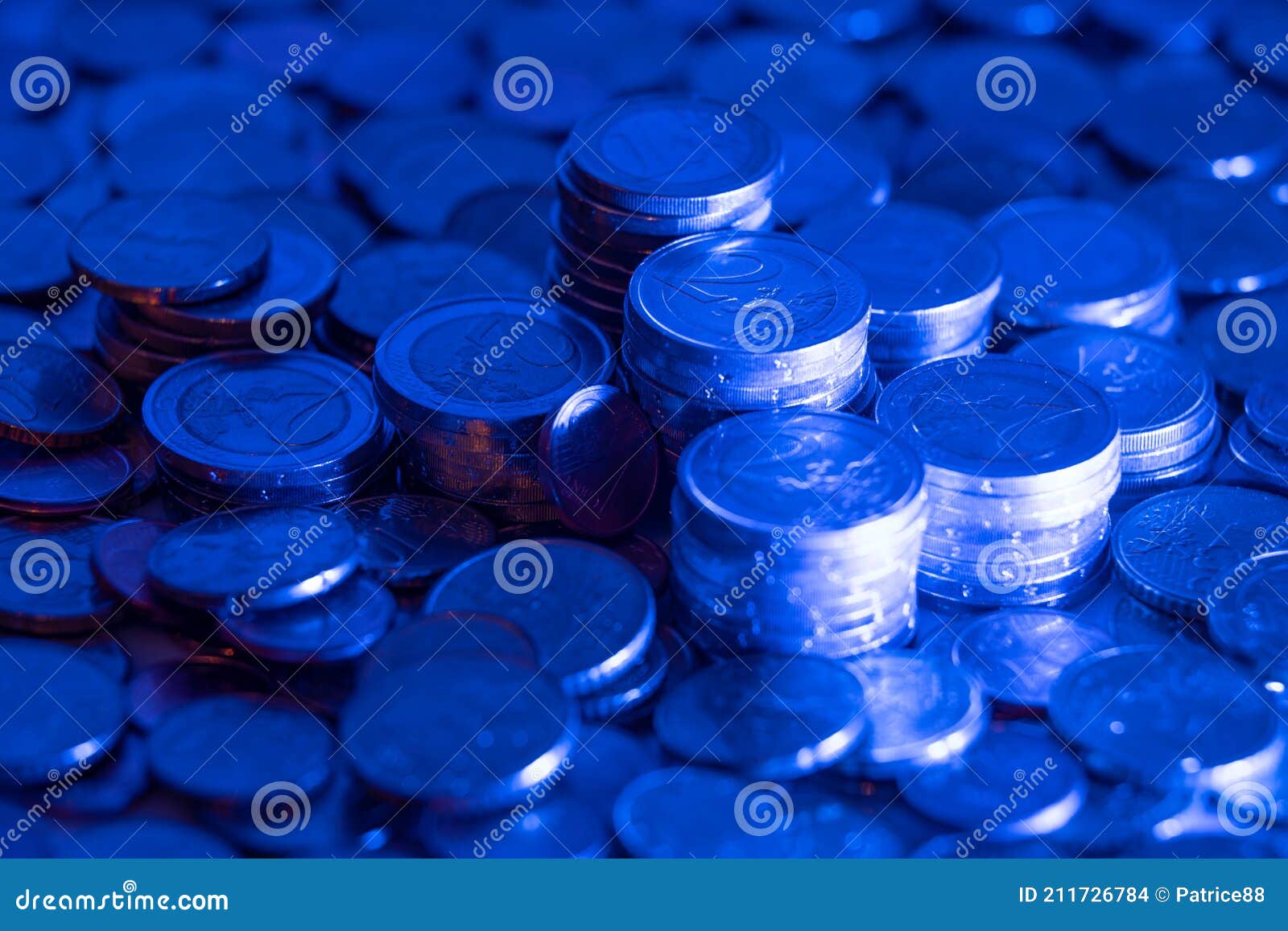 Euro Coins Under Blue Light in the Dark Stock Photo - Image of cash ...