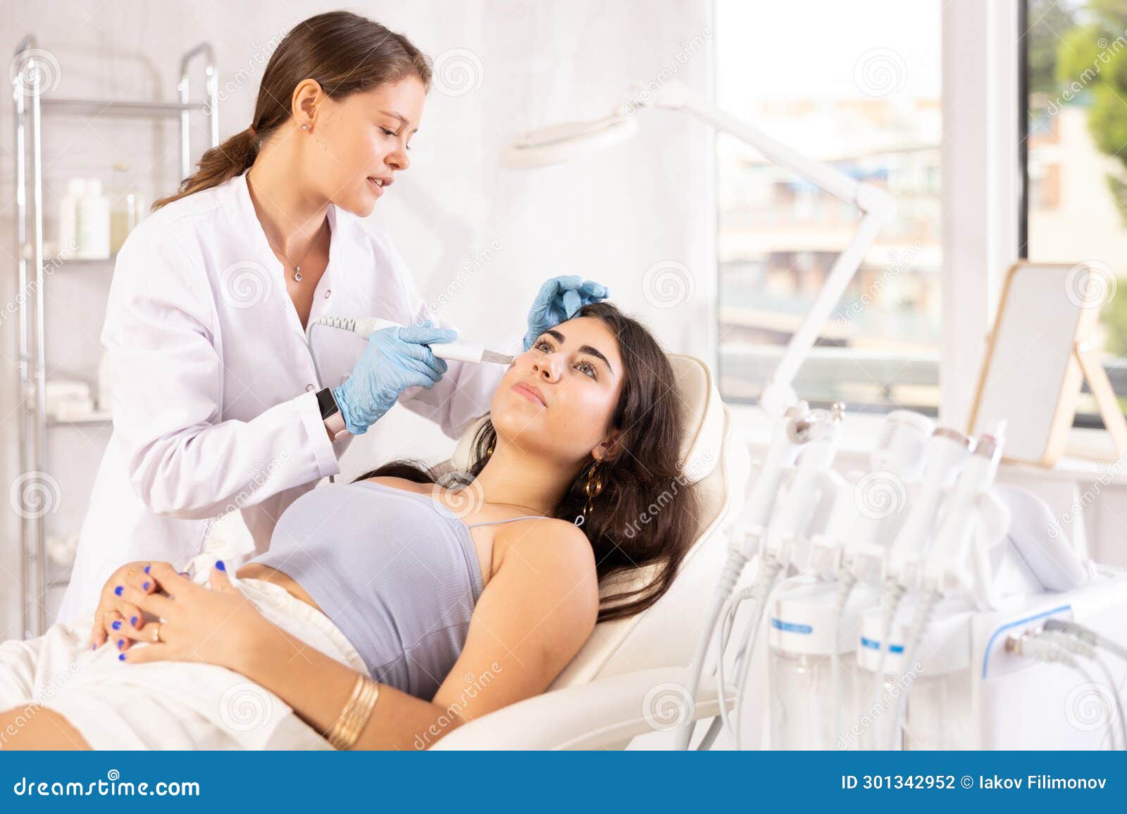 European Aesthetician Making Facial Beauty Procedure with Leather Knife ... European Aesthetician Making Facial Beauty Procedure with Leather Knife ...
