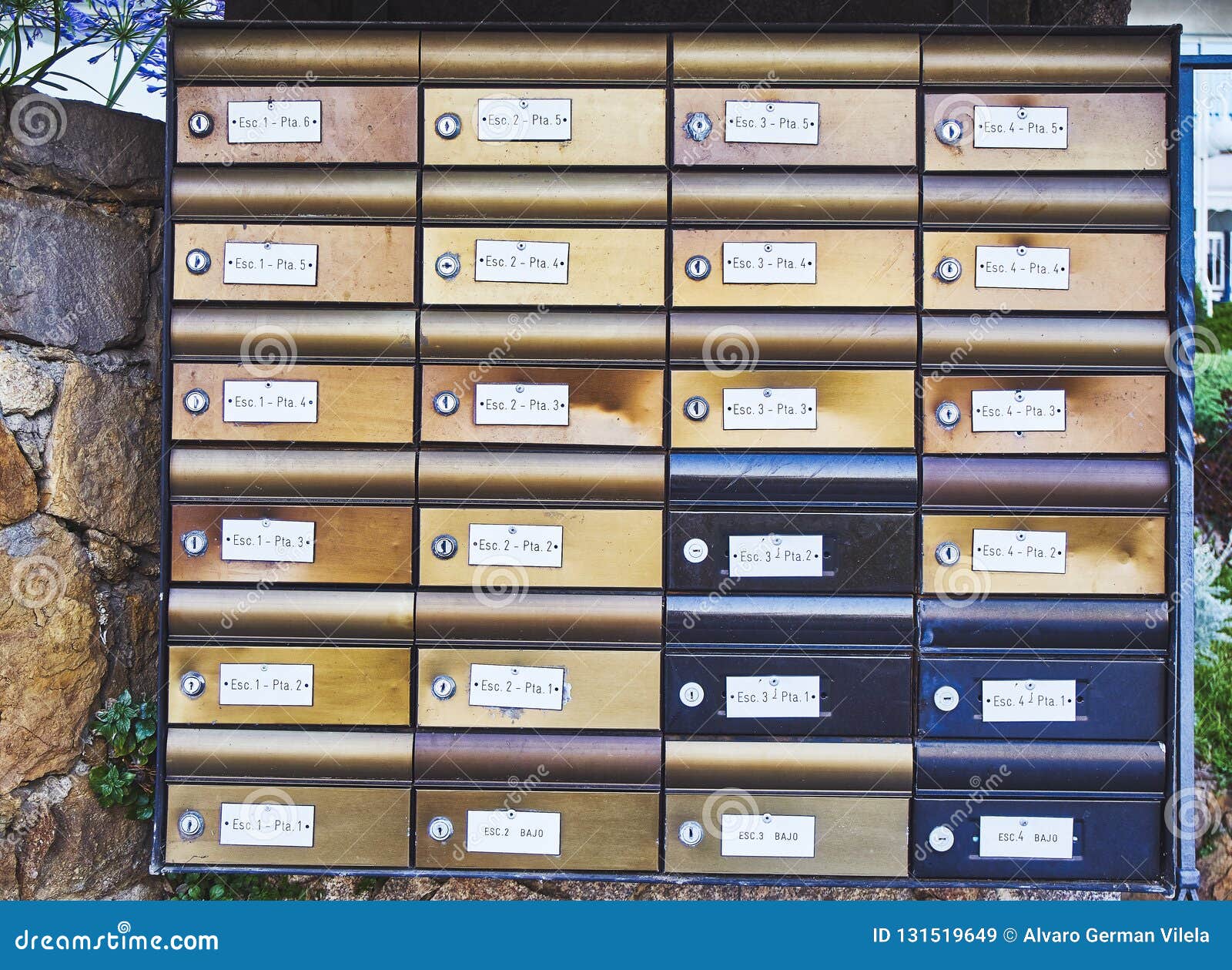 European Metallic Mailboxes on a Stone Wall. Stock Image - Image of ...