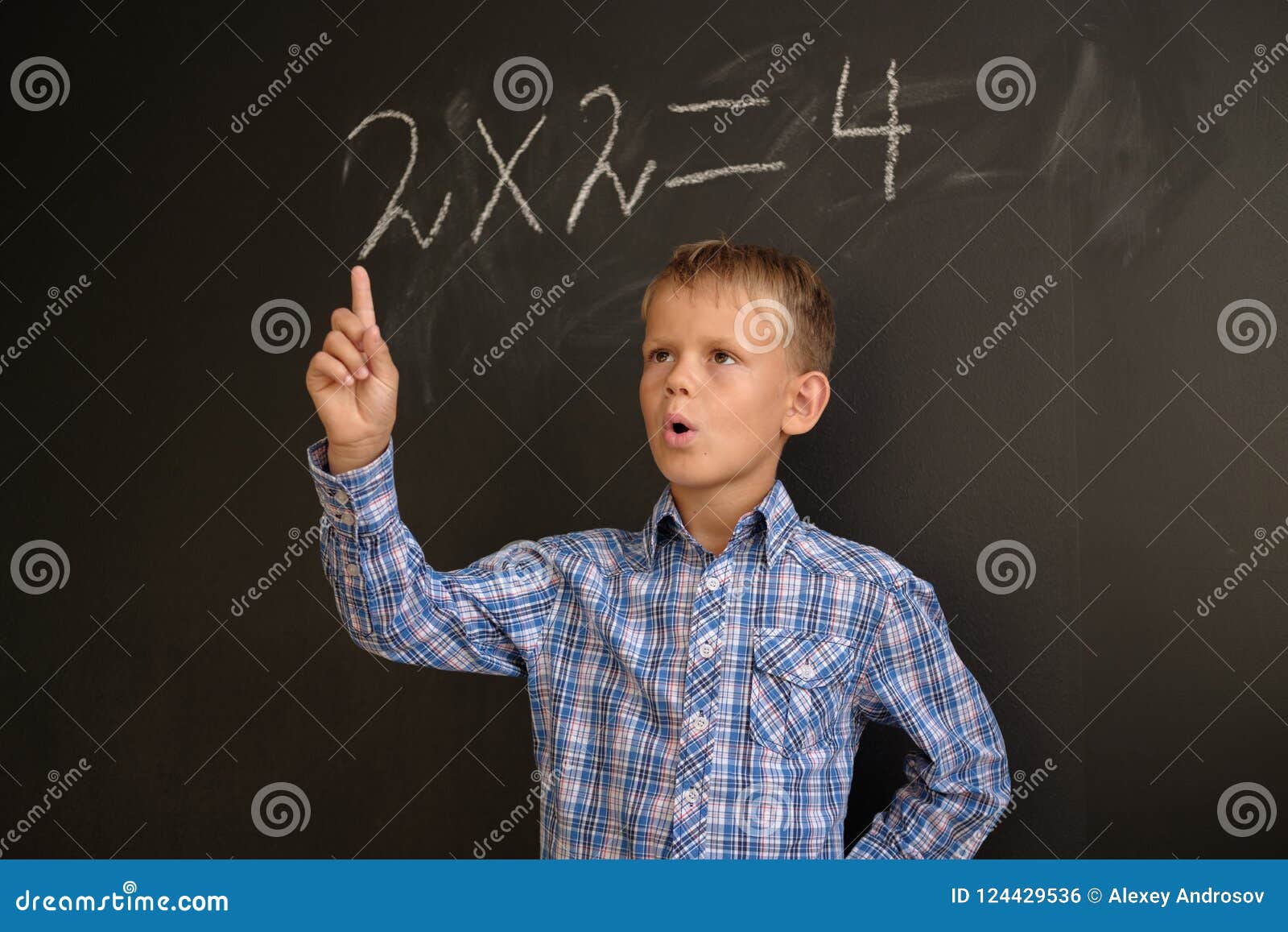 European Boy Thinking about Solving a Mathematical Problem, Standing at ...
