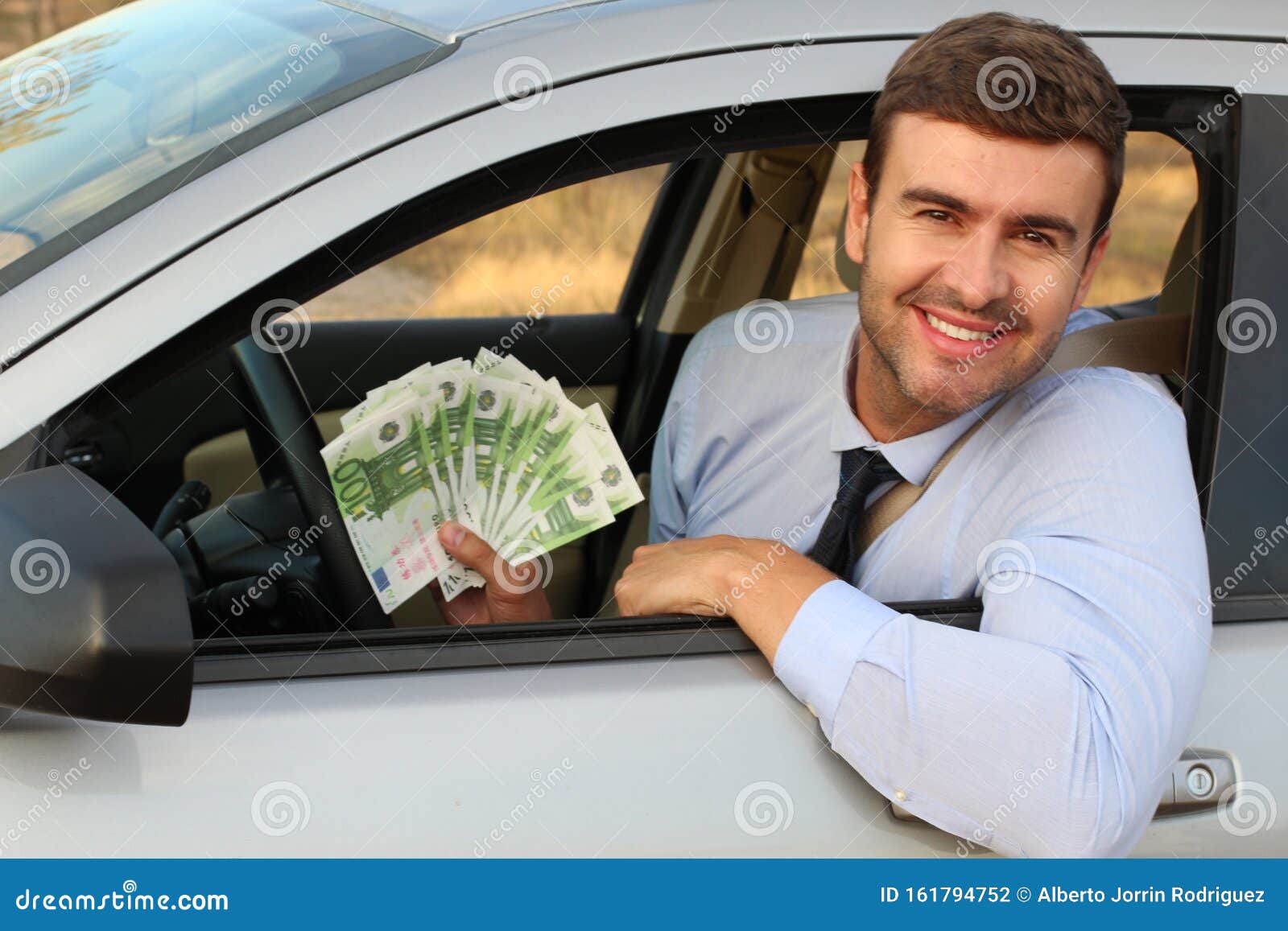 European Driver Holding 100 Euro Bills Stock Photo - Image of auto ...
