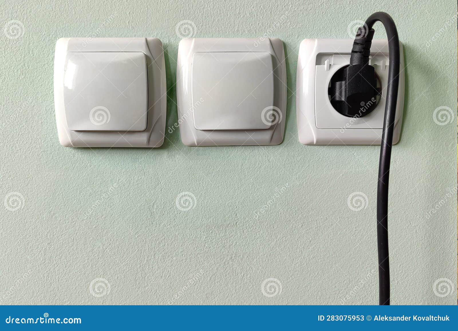 European Electrical Outlets with Plug Inserted into it on Modern Beige ...