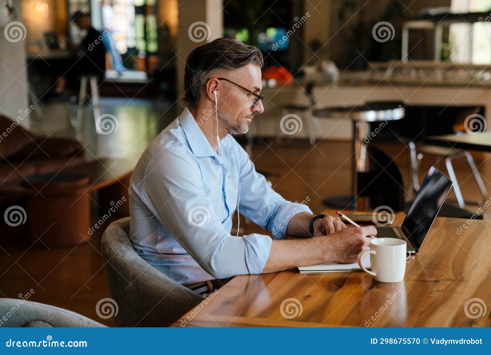European Grey Man Writing Down Notes while Working at Office Stock ...