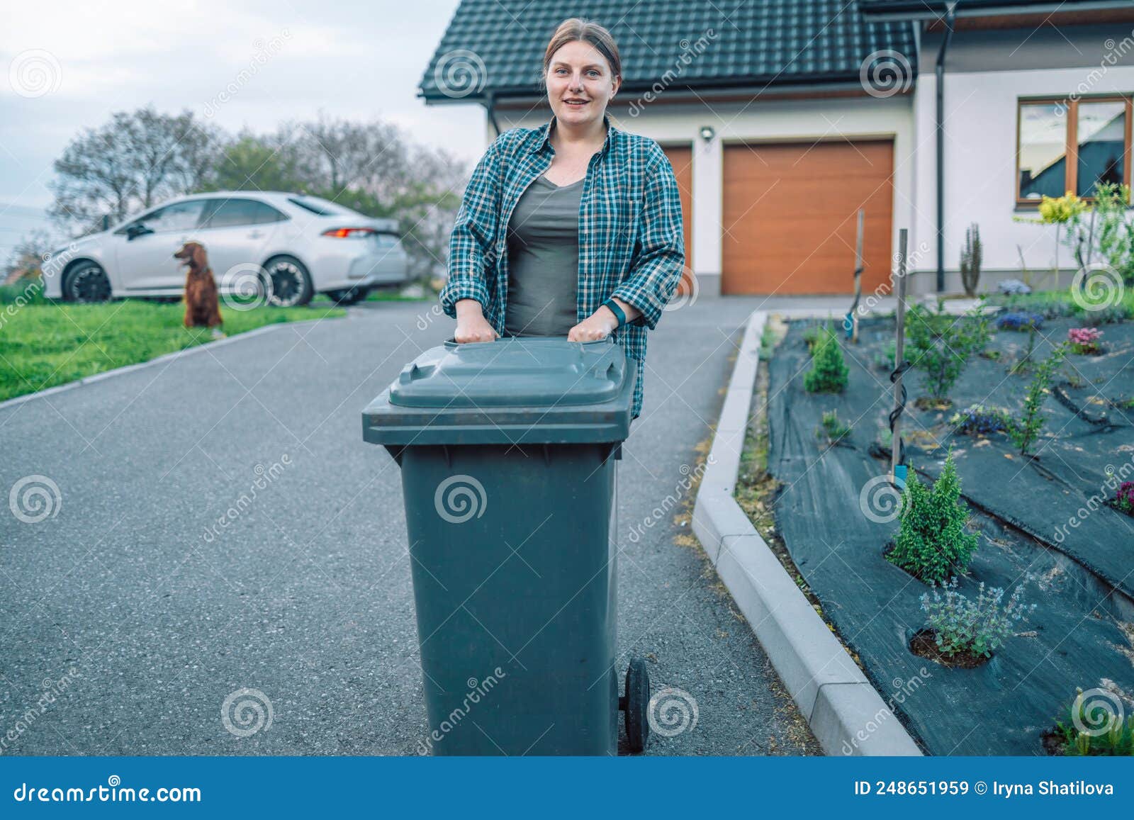 European 20s Girl Take Out the Trash Can Sorting Garbage Near a Home ... European 20s Girl Take Out the Trash Can Sorting Garbage Near a Home ...