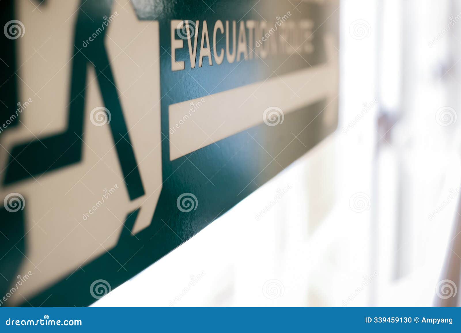Evacuation Route Direction Signage Placed in Public Transport Station ...