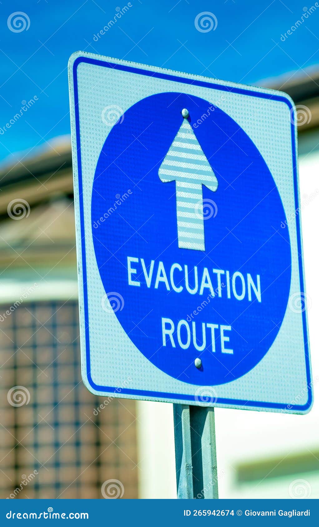 Evacuation Route Signal, Blue on White Stock Photo - Image of pacific ...