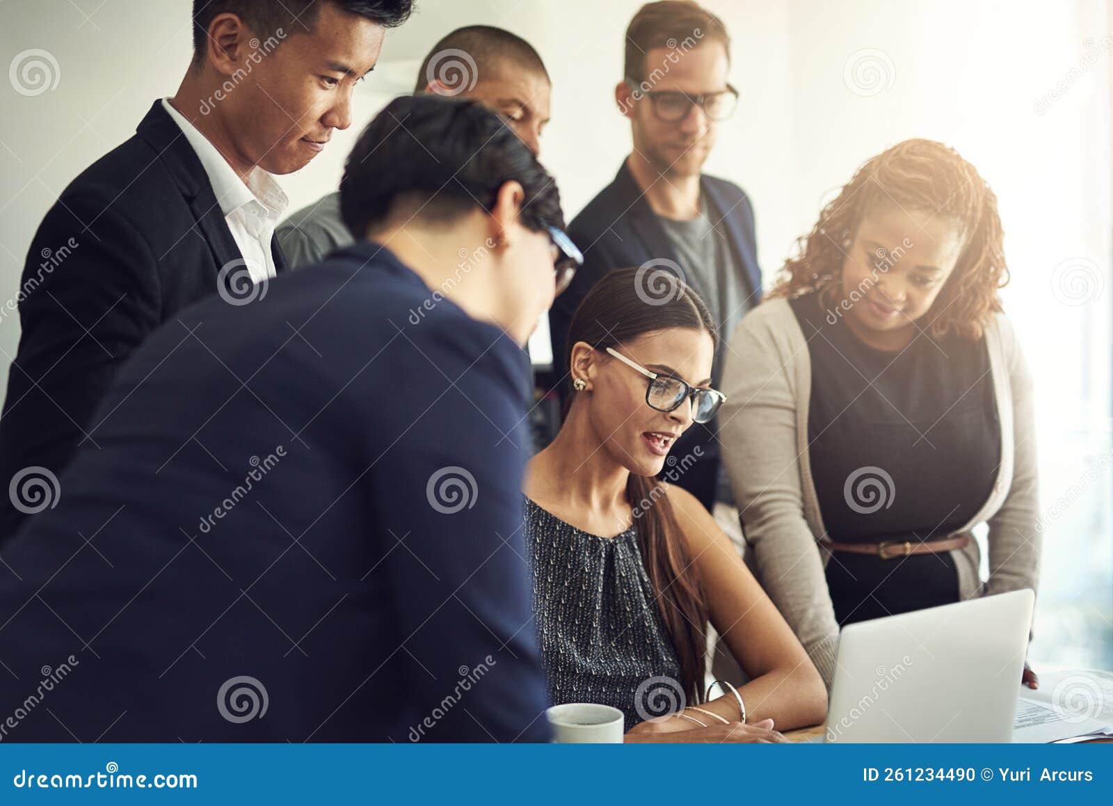 Evaluating the Pros and the Cons. a Group of Coworkers Discussing ... Evaluating the Pros and the Cons. a Group of Coworkers Discussing ...