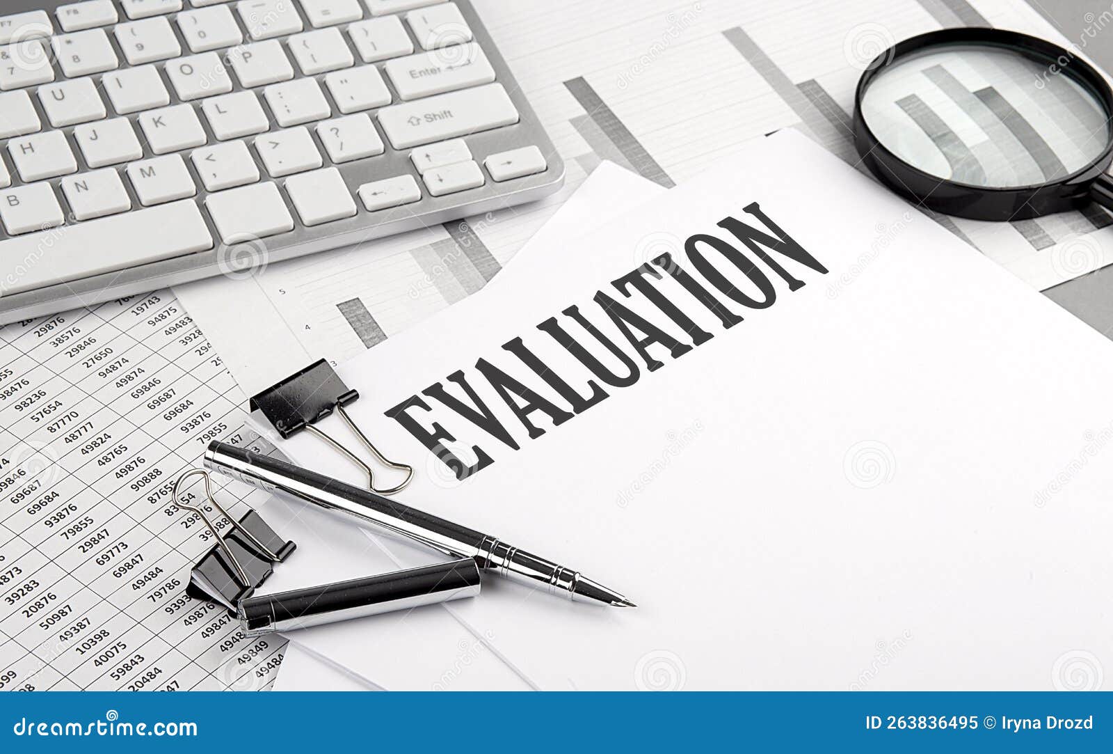 EVALUATION Text on Paper with Chart and Keyboard, Business Concept ...