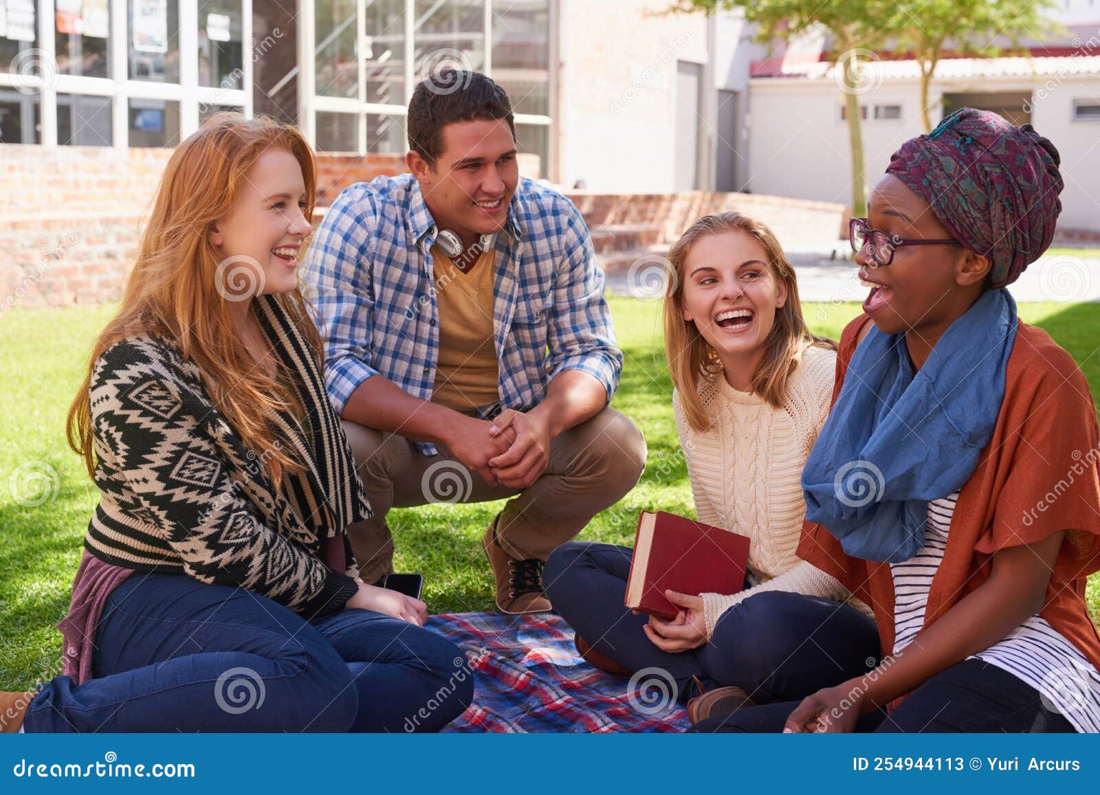 Even on Their Breaks they Make Time for Studying. a Group of Young ...