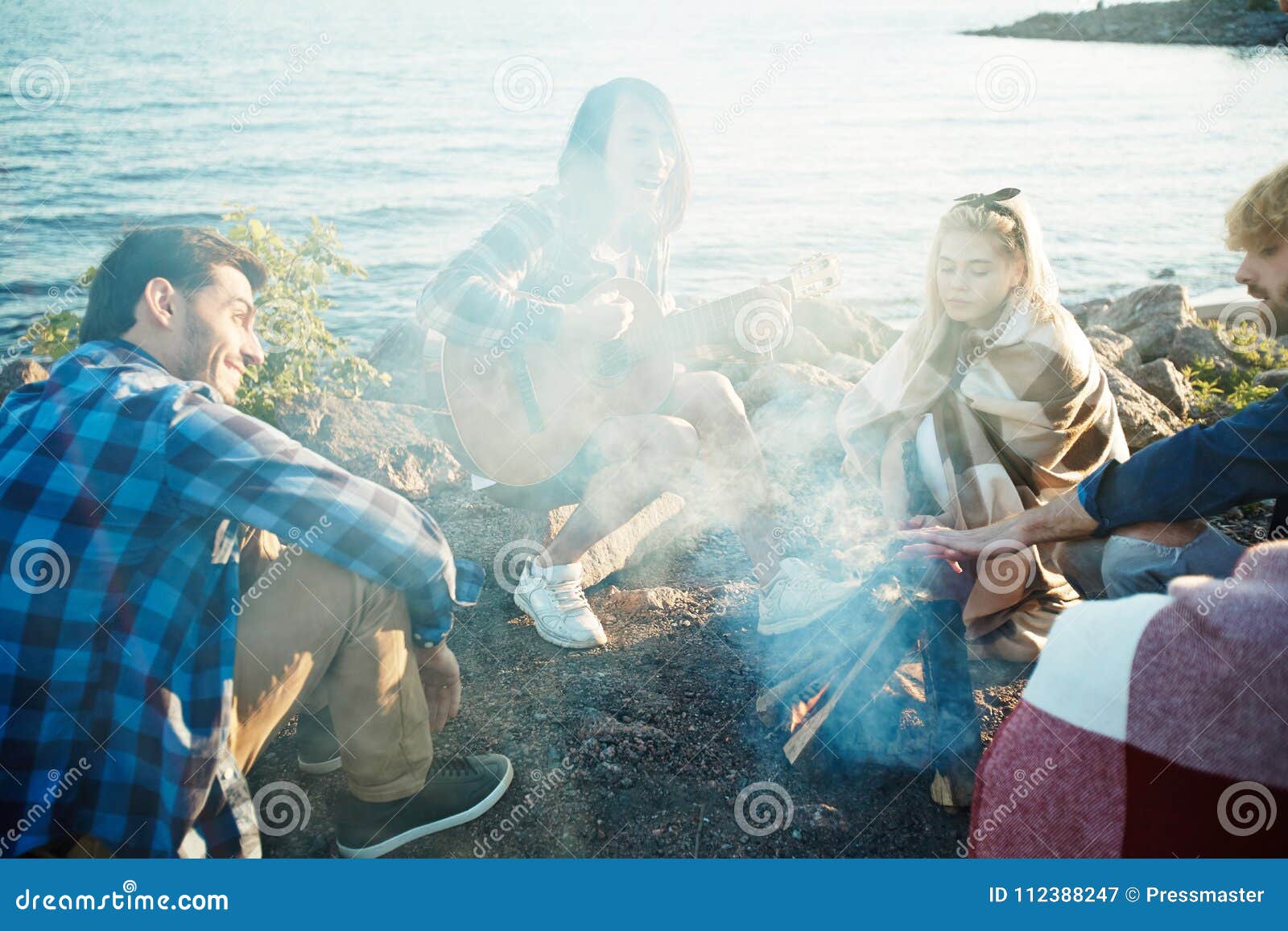 Evening by campfire stock image. Image of outdoors, summer - 112388247