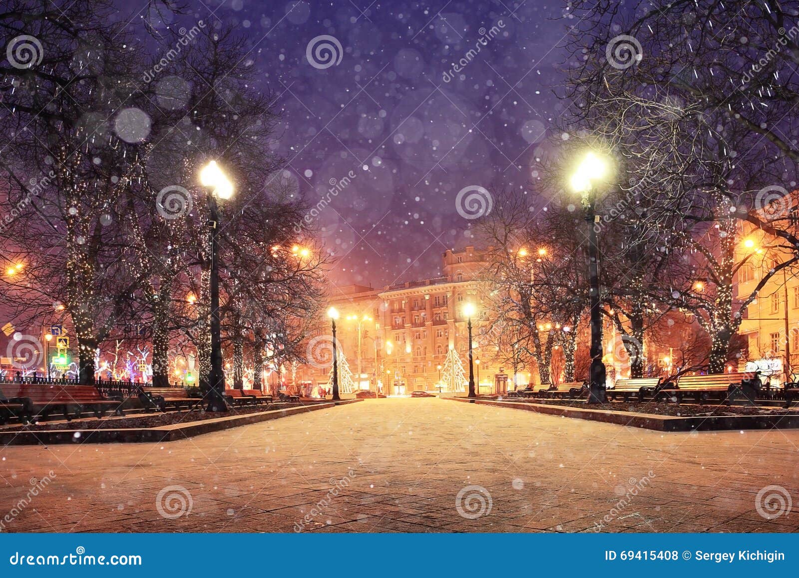 Evening city with snow stock photo. Image of bright, dark - 69415408