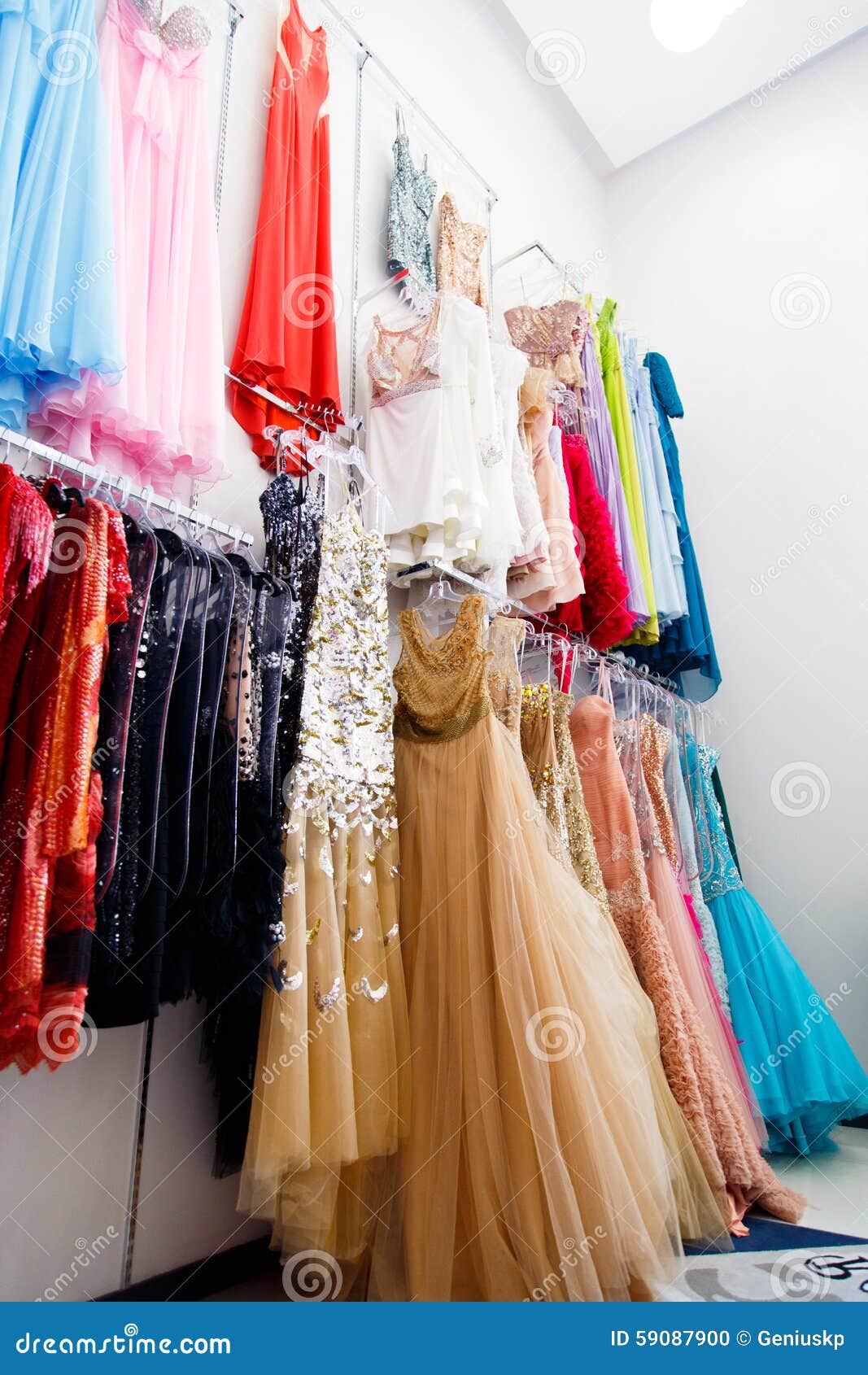 Evening dresses on hangers stock photo. Image of multicolor - 59087900